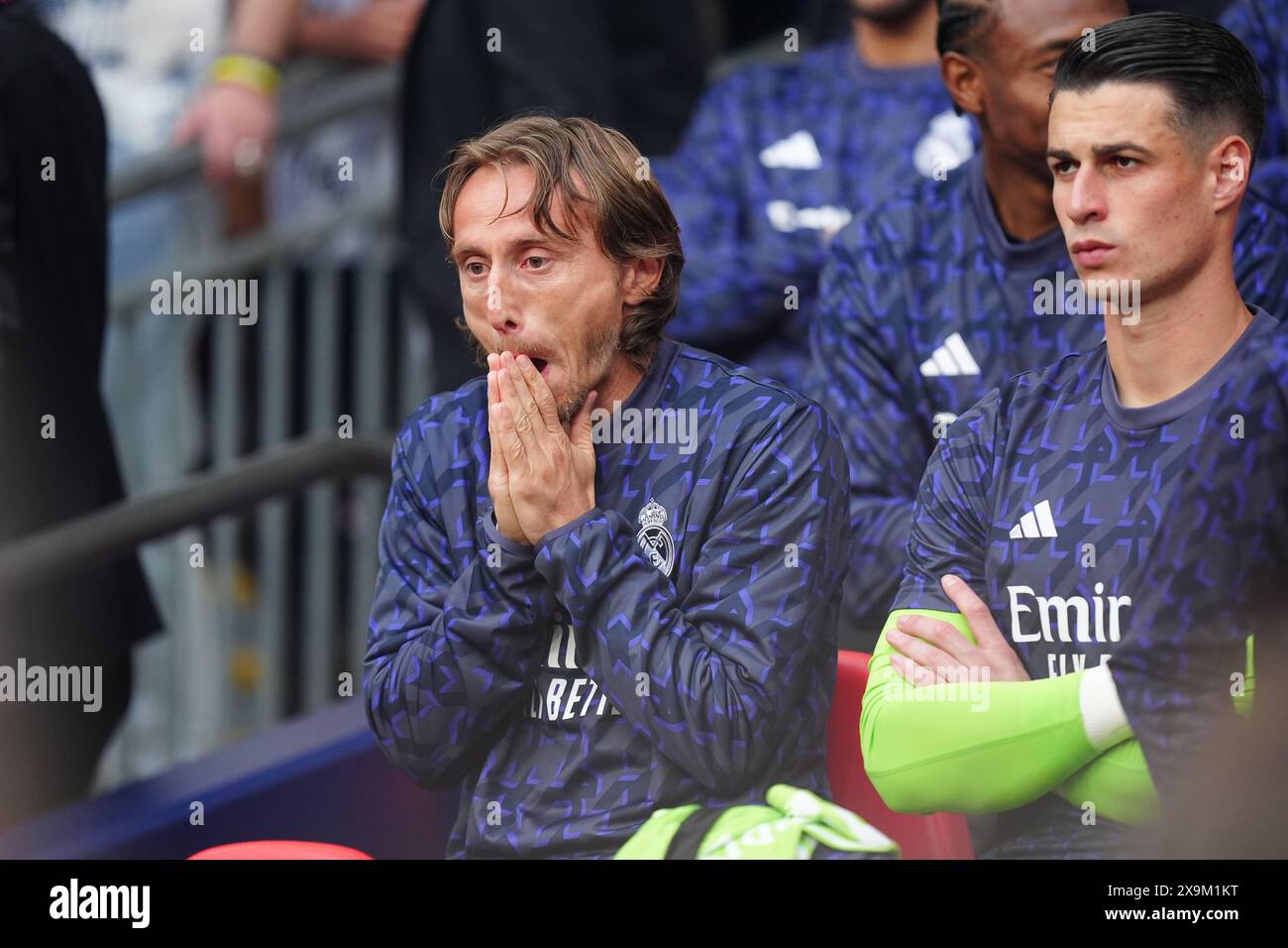 Real Madrid's Luka Modric (left) on the substitutes bench during the ...