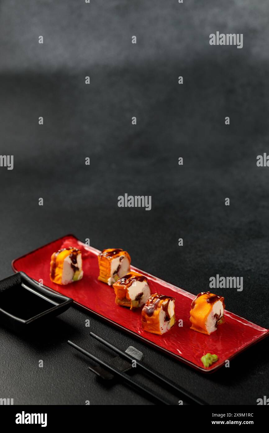 a Mami roll with succulent snow crab is elegantly showcased against a ...