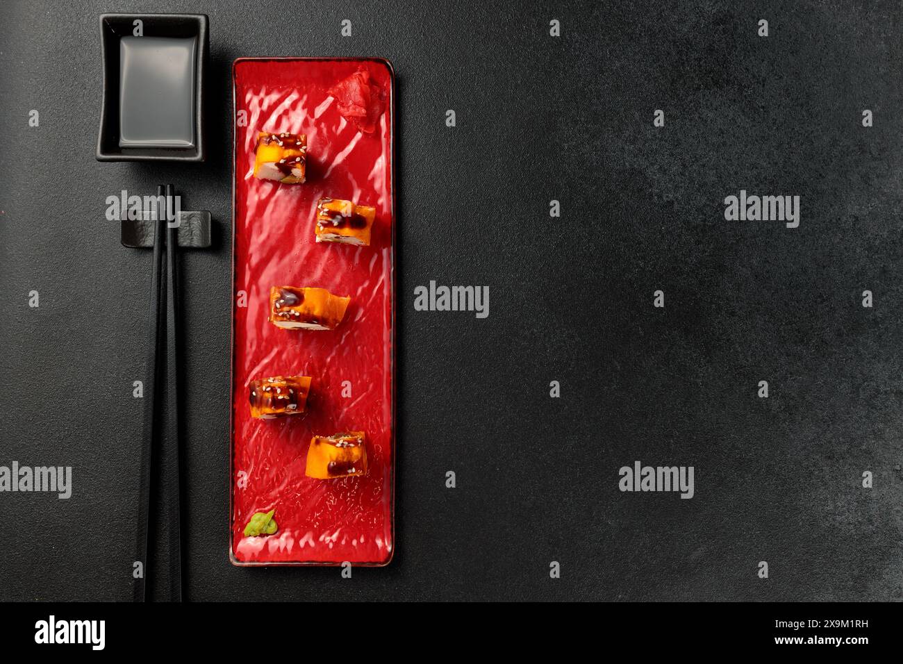 a Mami roll with succulent snow crab is elegantly showcased against a ...