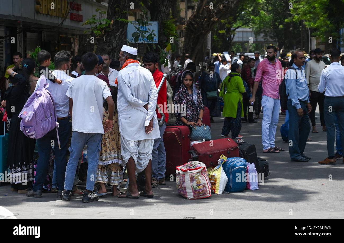 MUMBAI, INDIA - JUNE 1: Passengers are awaiting a taxi outside Dadar ...