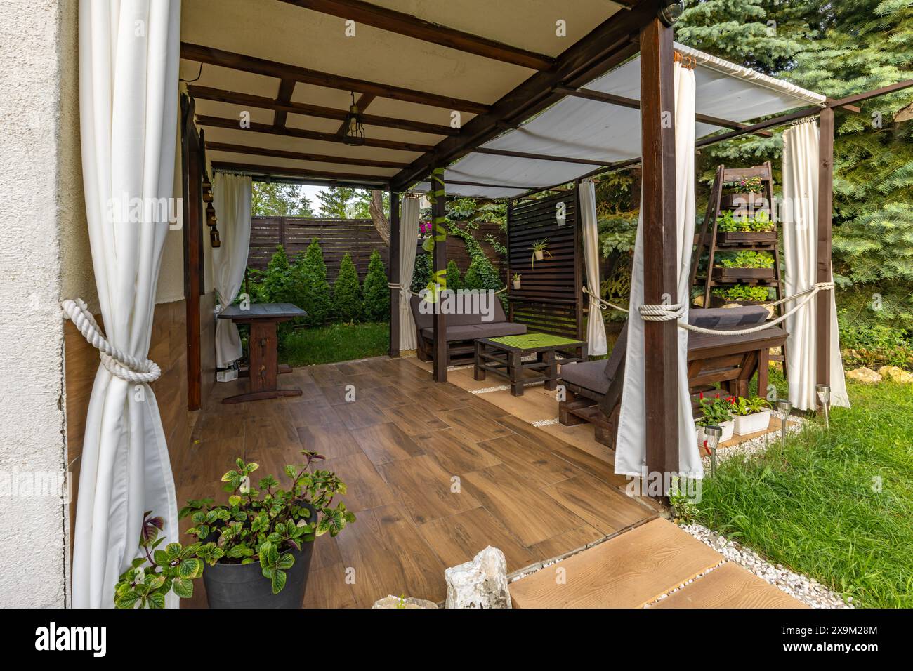 Garden terrace, resting place, garden furniture made of wooden pallets ...