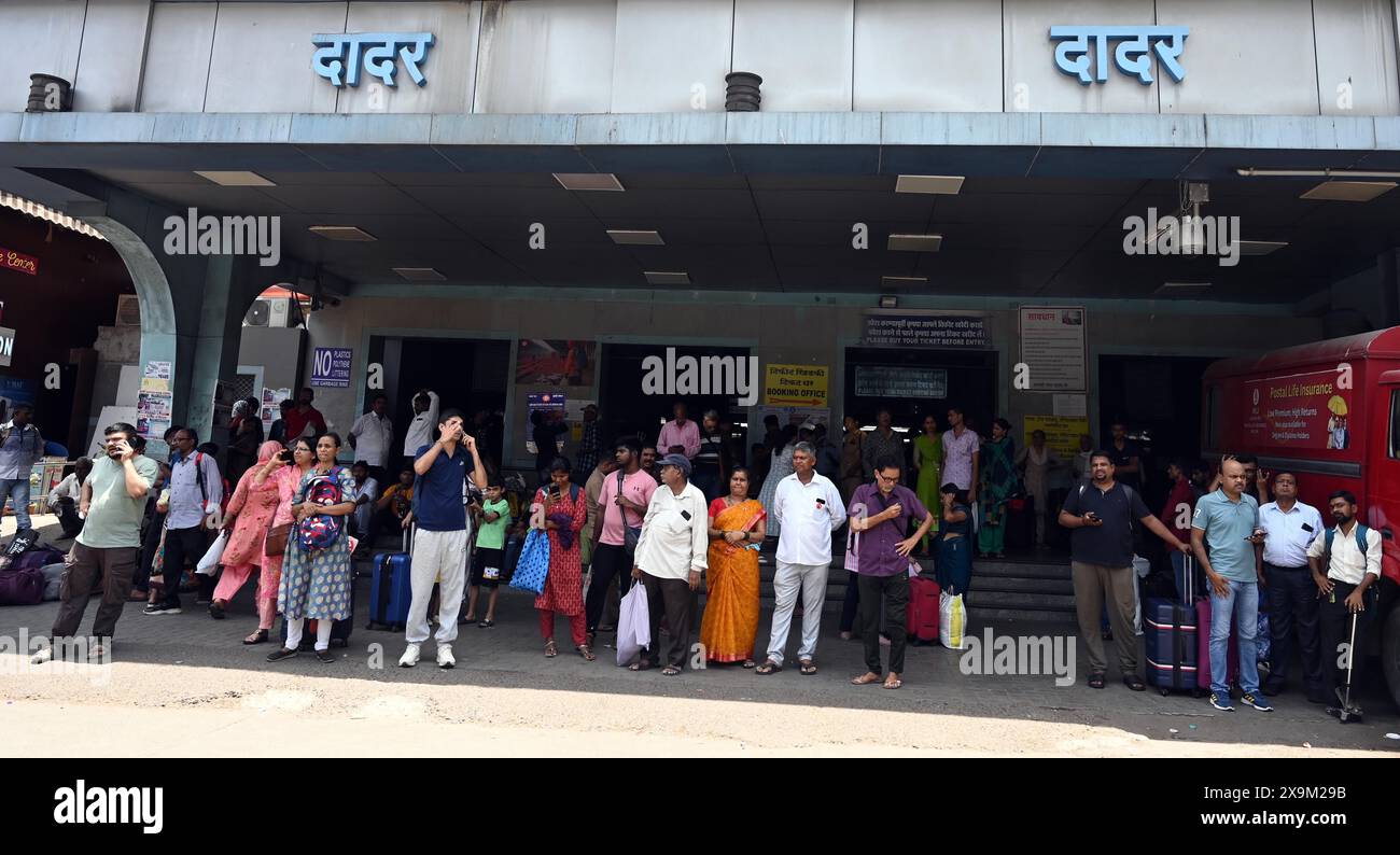MUMBAI, INDIA - JUNE 1: Passengers are awaiting a taxi outside Dadar ...