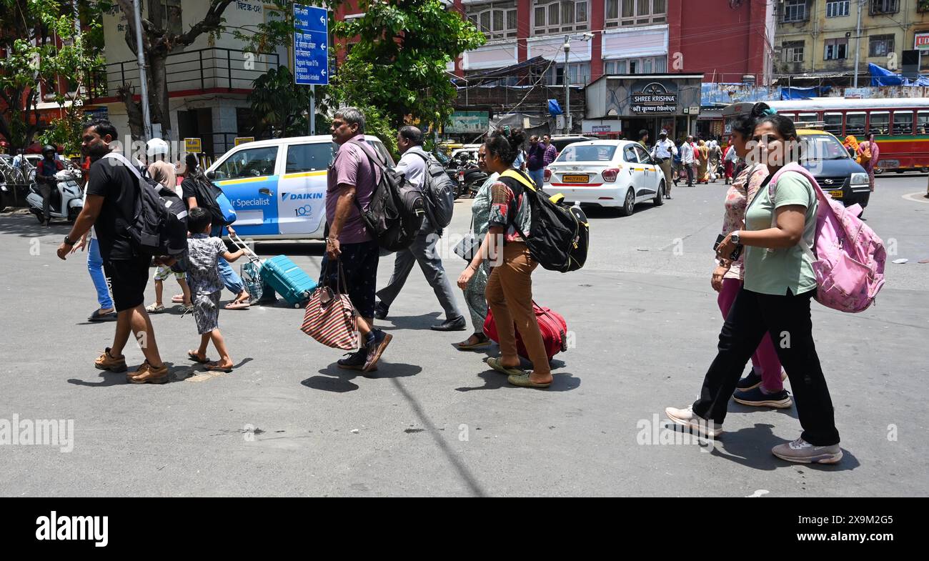 MUMBAI, INDIA - JUNE 1: Passengers are awaiting a taxi outside Dadar ...