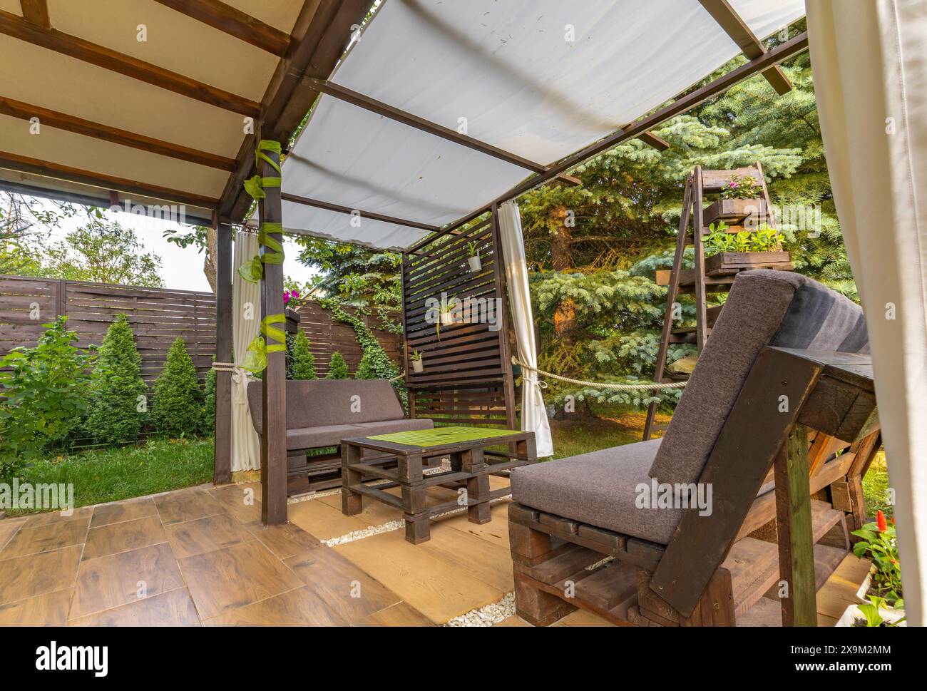 Garden terrace, resting place, garden furniture made of wooden pallets ...