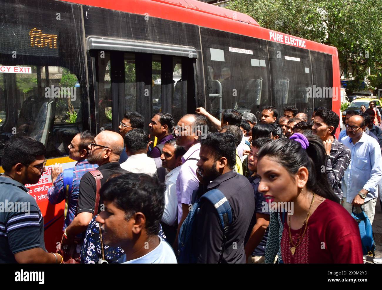 MUMBAI, INDIA - JUNE 1: Railway commuters rush to catch the Best Bus to ...