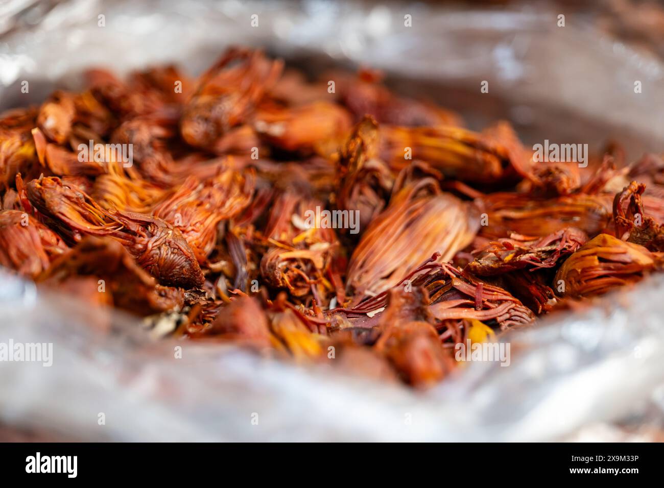 Close-up view of Jathipathri (Mace spice) in bulk, showcasing its ...