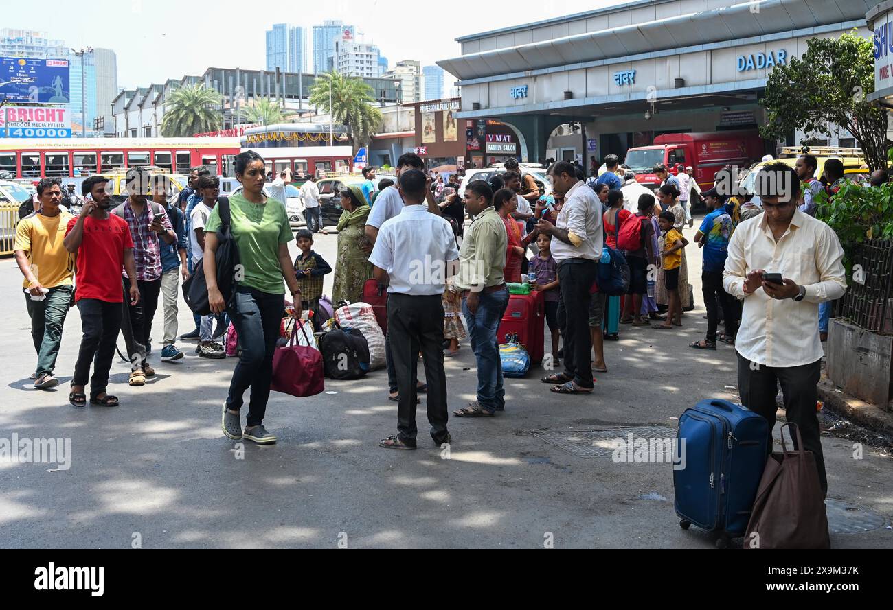 MUMBAI, INDIA - JUNE 1: Passengers are awaiting a taxi outside Dadar ...