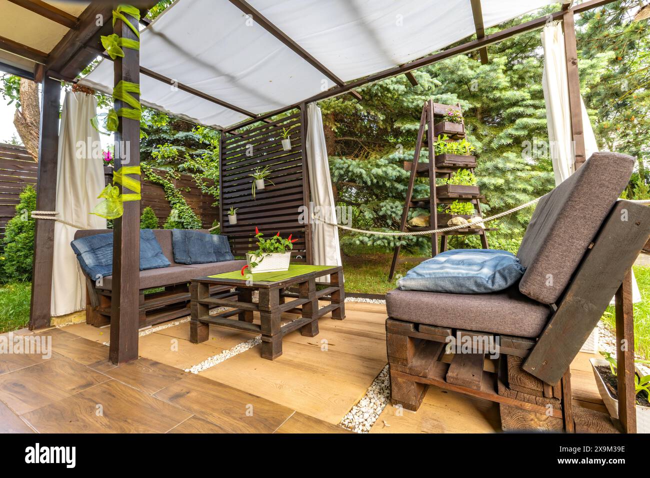 Garden terrace, resting place, garden furniture made of wooden pallets ...