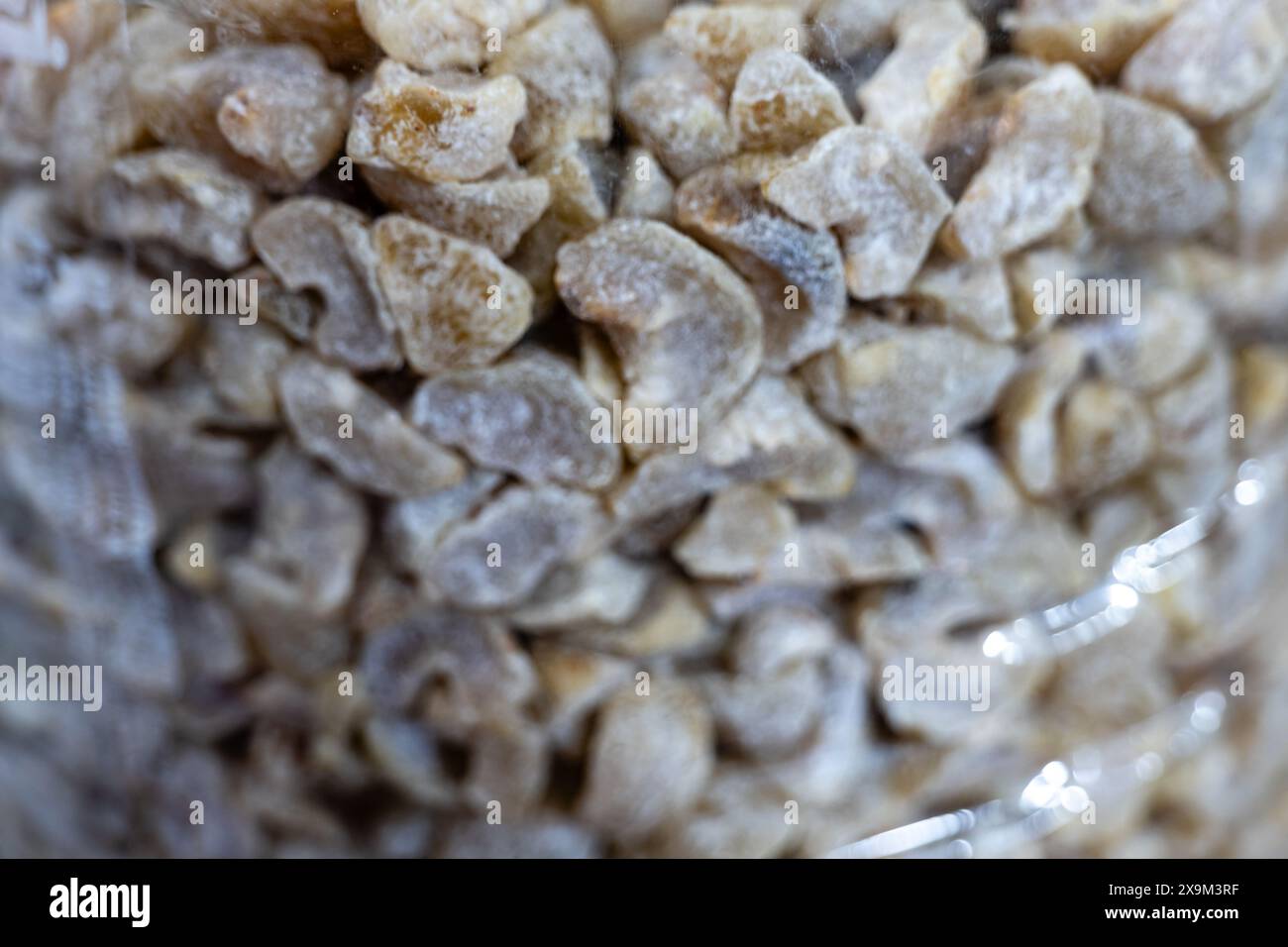 Close-up view of dry amla pieces packaged for culinary and medicinal ...