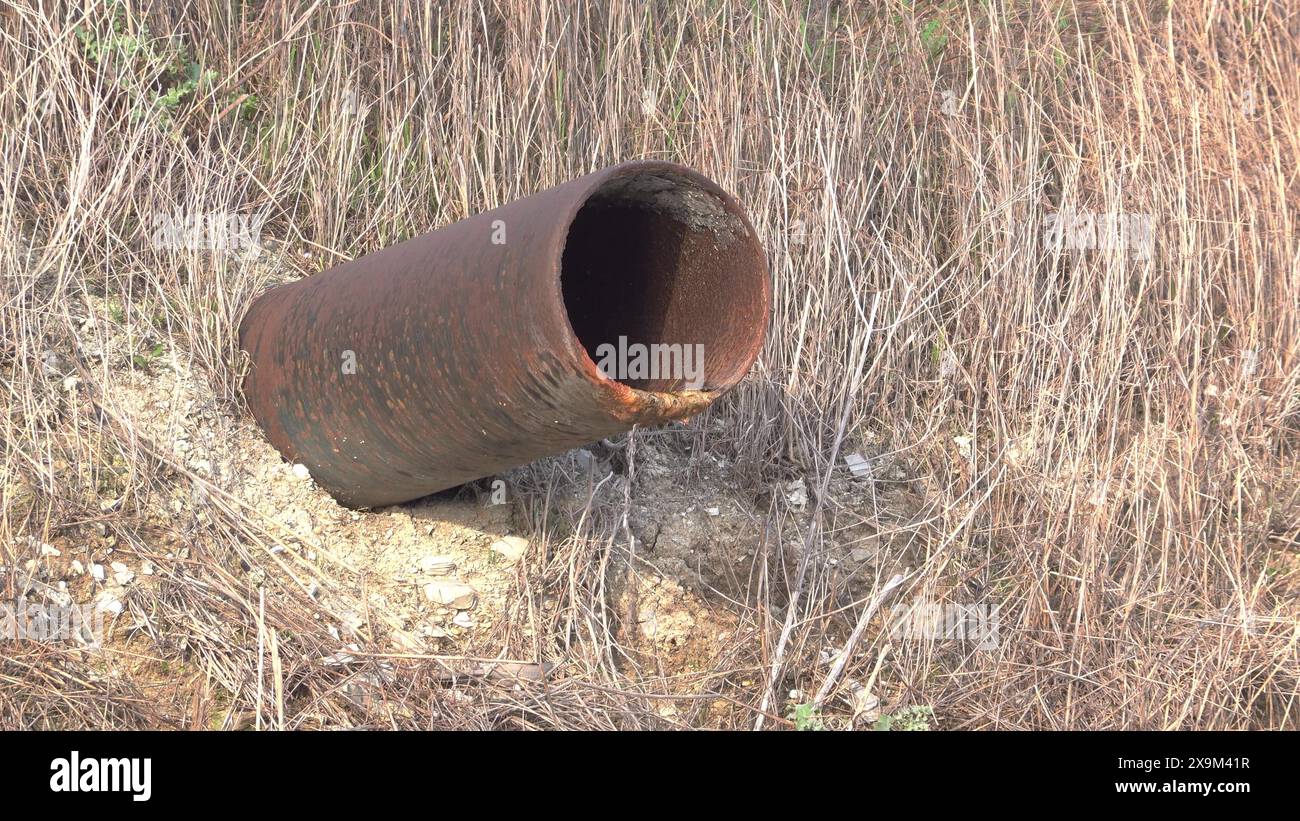 Dirty sewage from the pipe, environmental pollution Stock Photo - Alamy