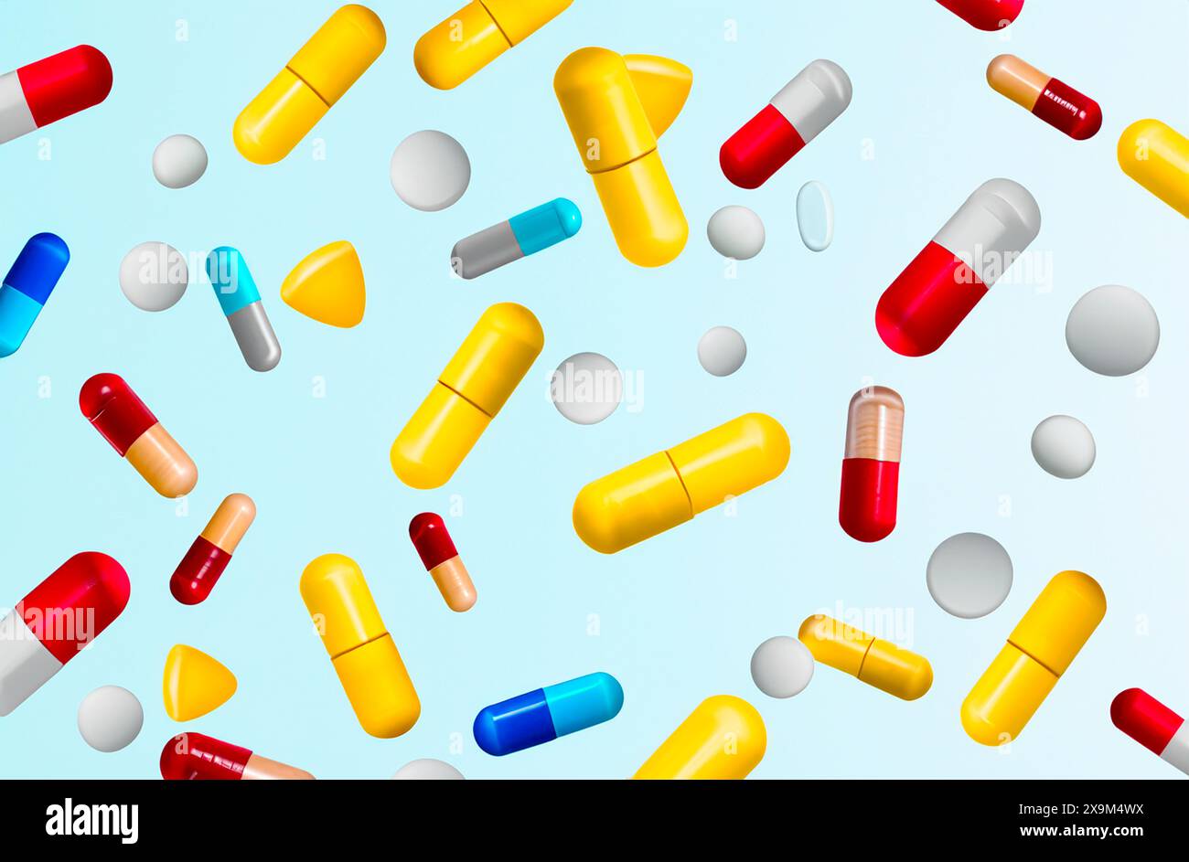 Falling medicine pills and antibiotics isolated over blue background ...
