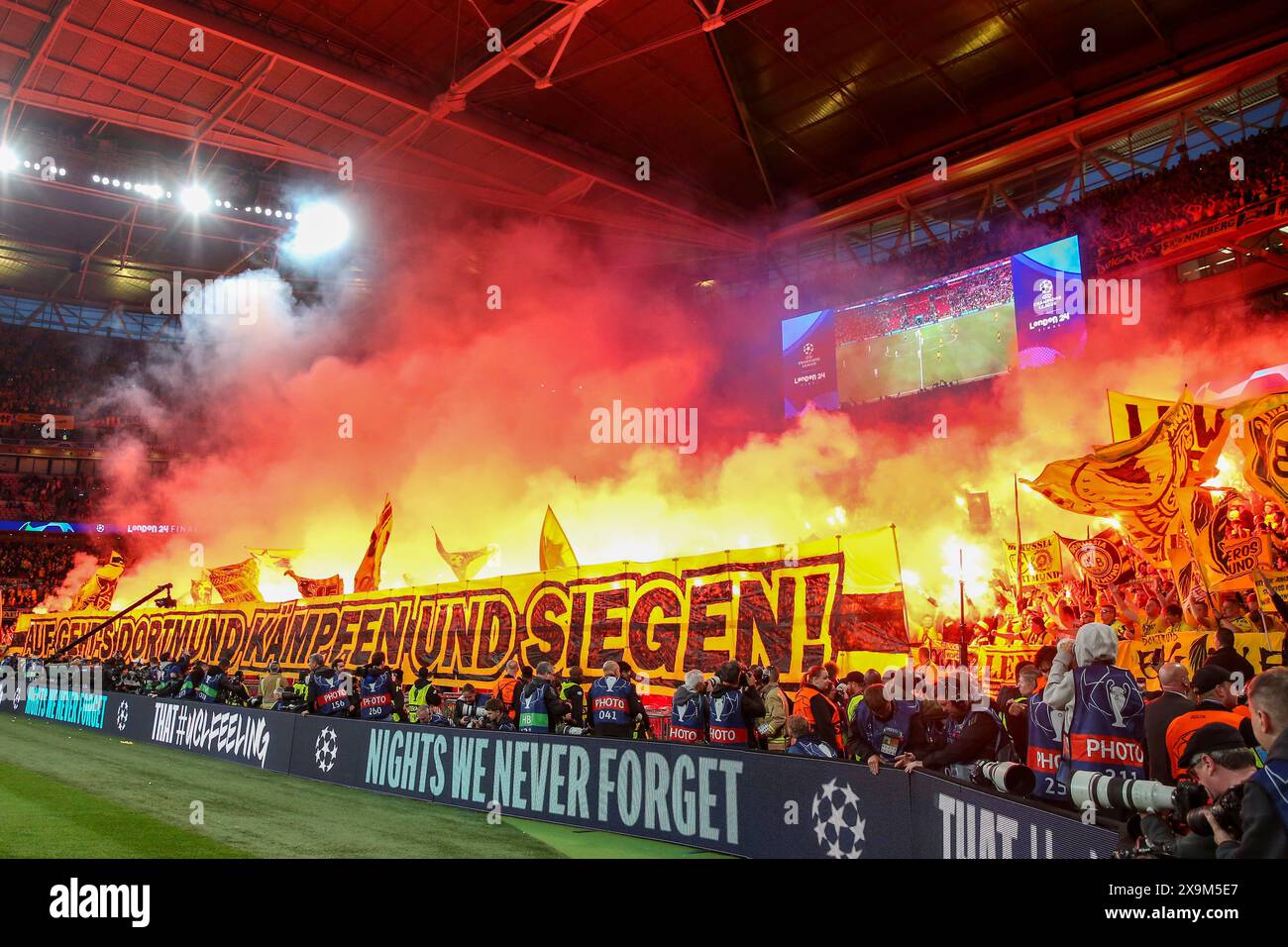 London, UK. 01st June, 2024. Flares on the yellow wall during the ...