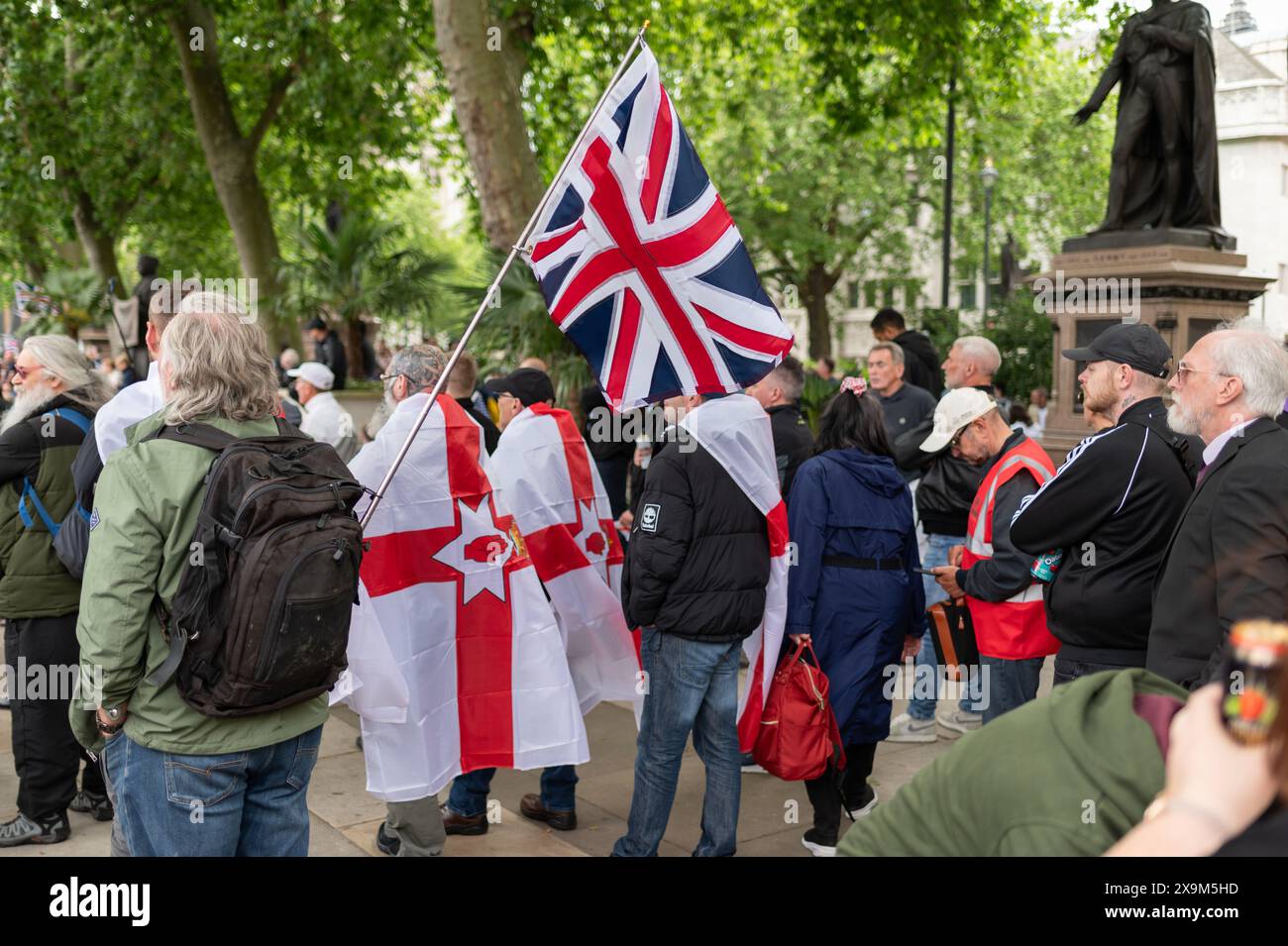 London, UK. 01st June, 2024. Tommy Robinson supporters with flags ...