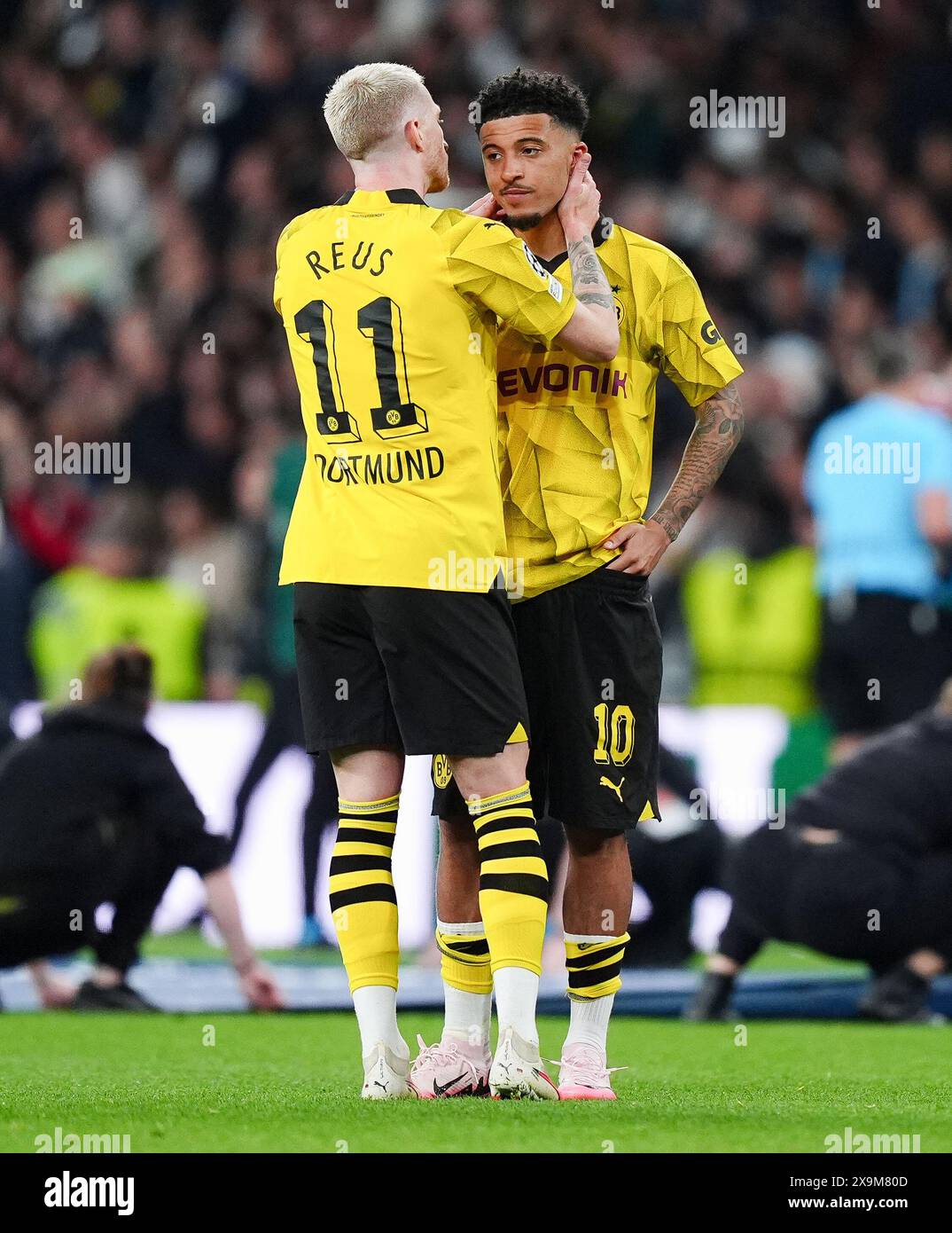 Borussia Dortmund's Marco Reus (left) and Jadon Sancho react after ...