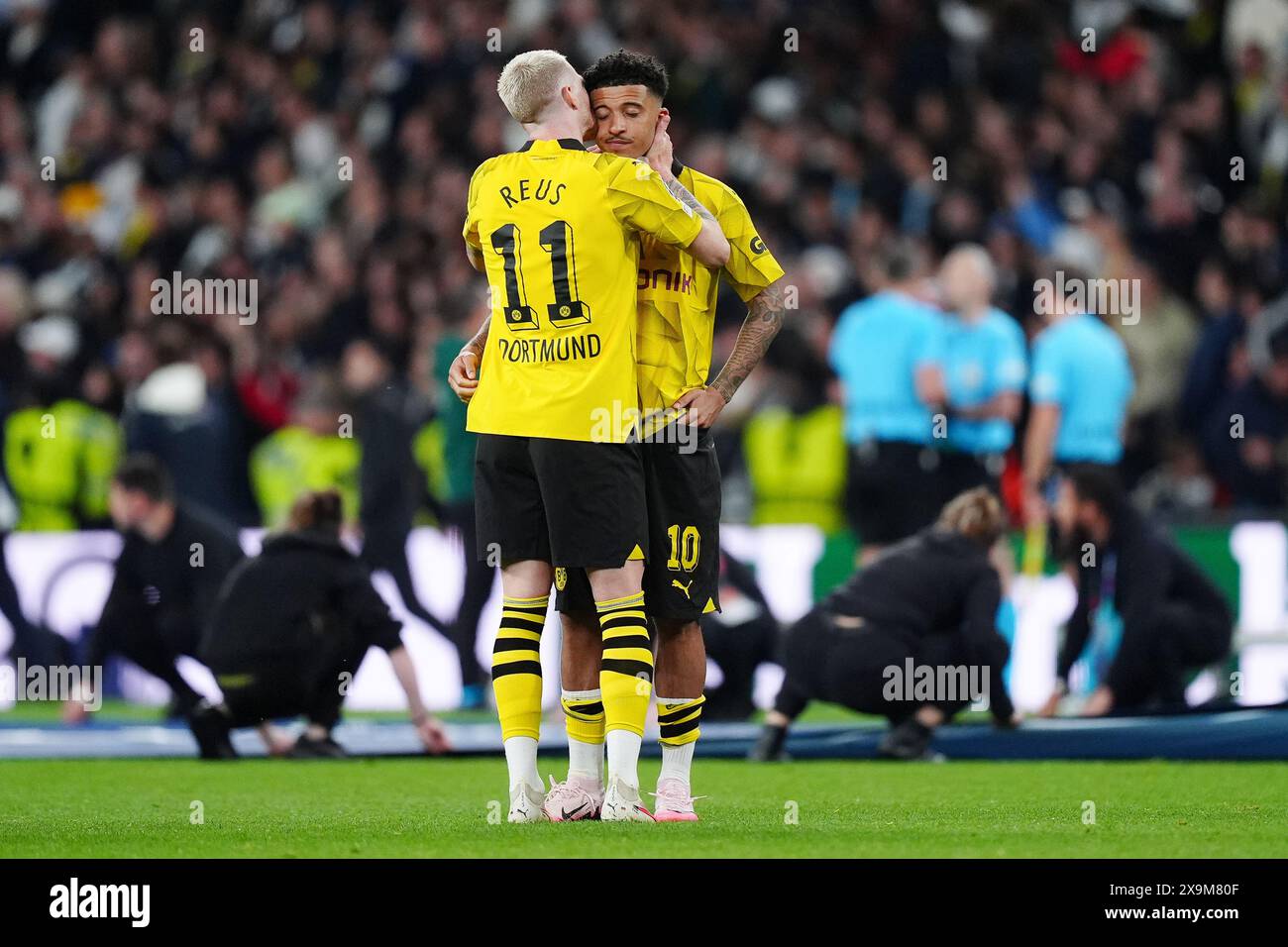 Borussia Dortmund's Marco Reus (left) and Jadon Sancho react after ...