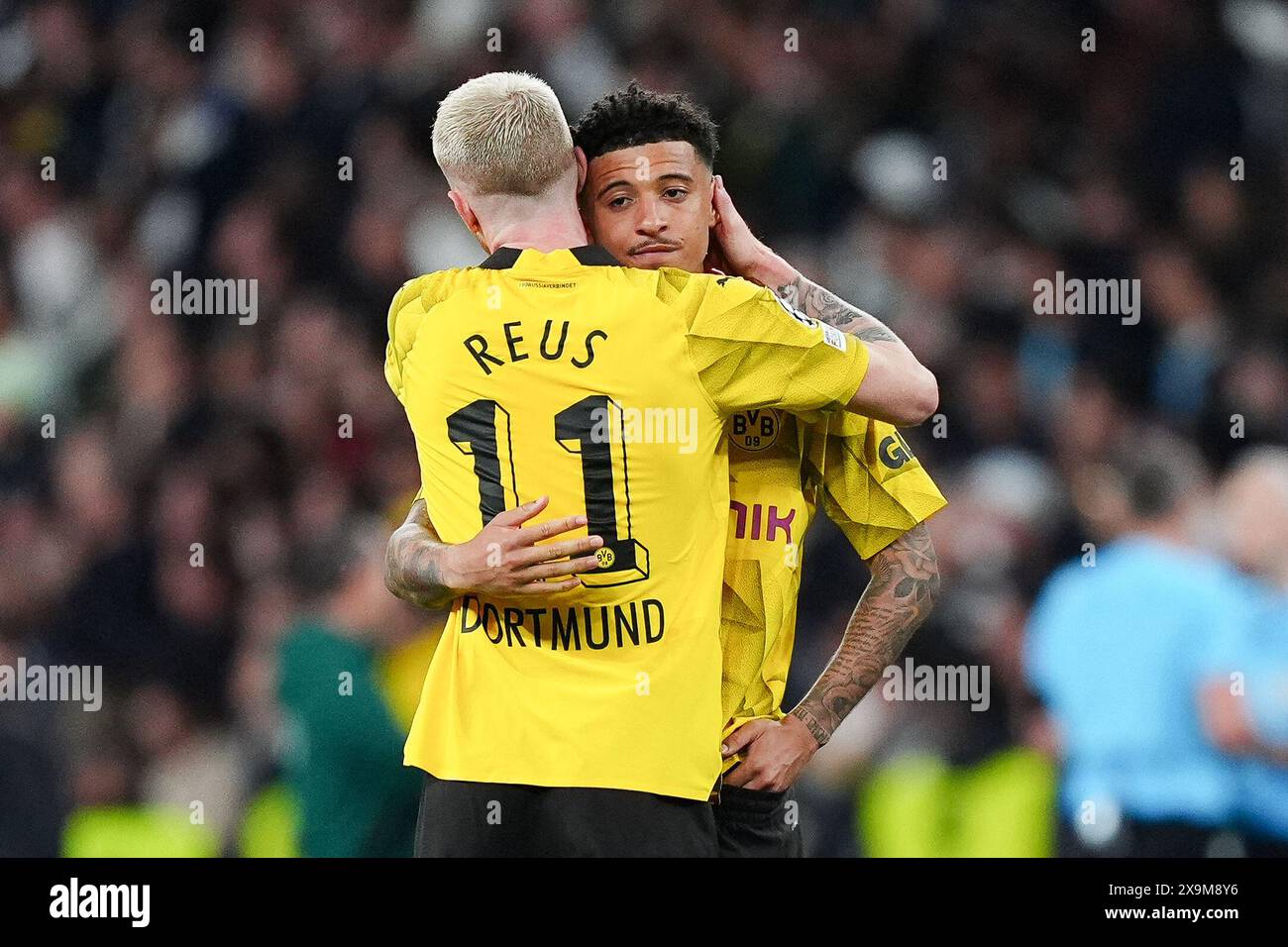 Borussia Dortmund's Marco Reus (left) and Jadon Sancho react after ...