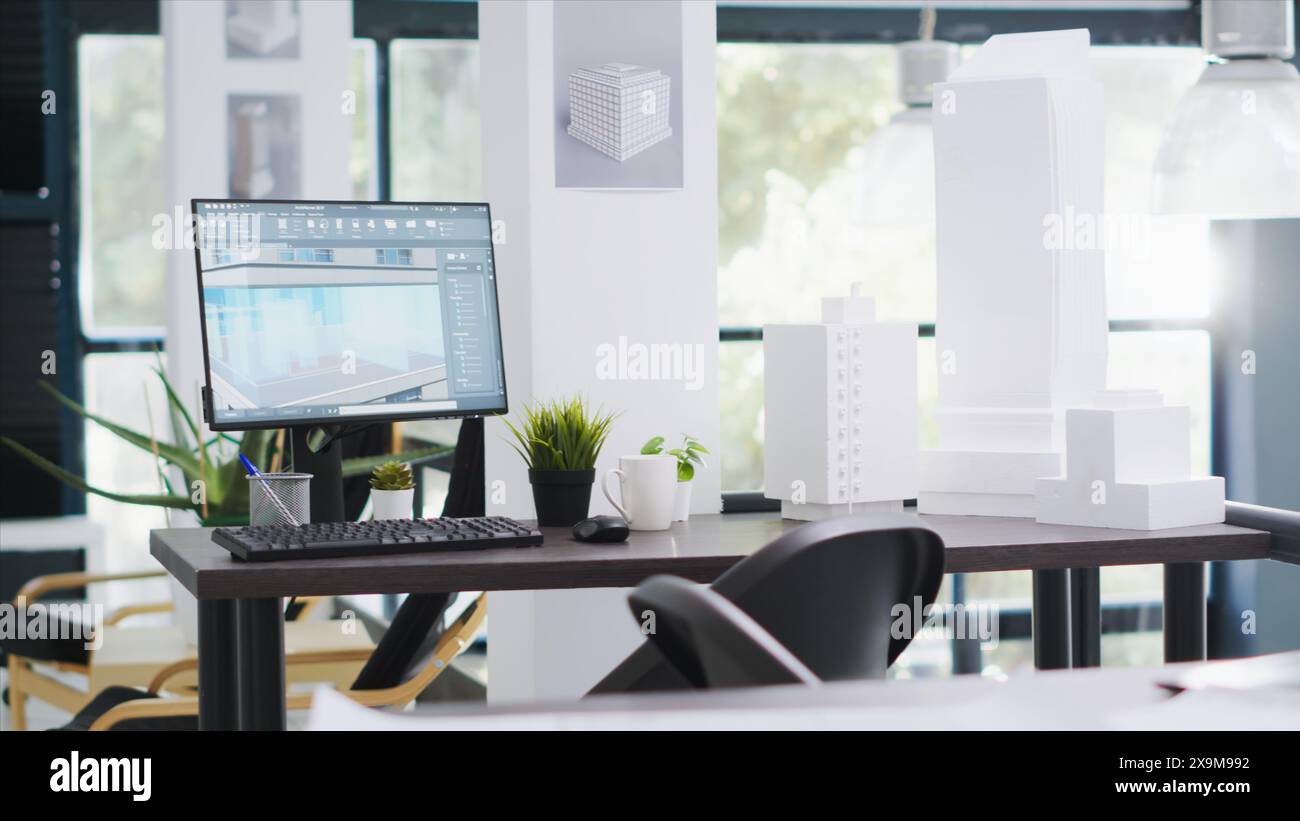 Designing office has empty desk with computer operating cad, production ...