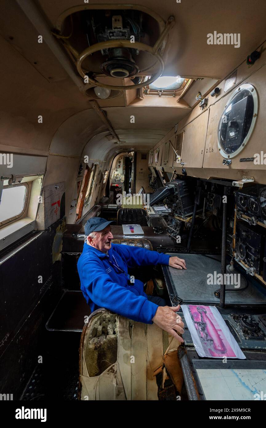 Charlwood, UK. 1 June 2024. Nev Feist, tour guide, at the navigator's ...