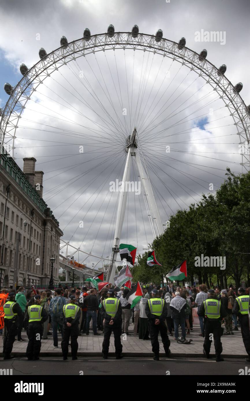 June 1, 2024, London, England, UK: Police officers form a cordon around ...
