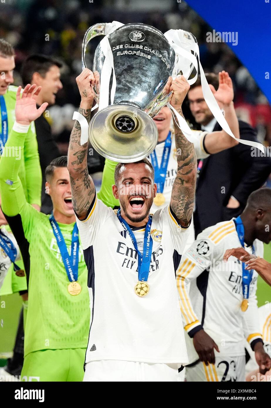 Real Madrid's Joselu celebrates with the trophy after winning the UEFA ...