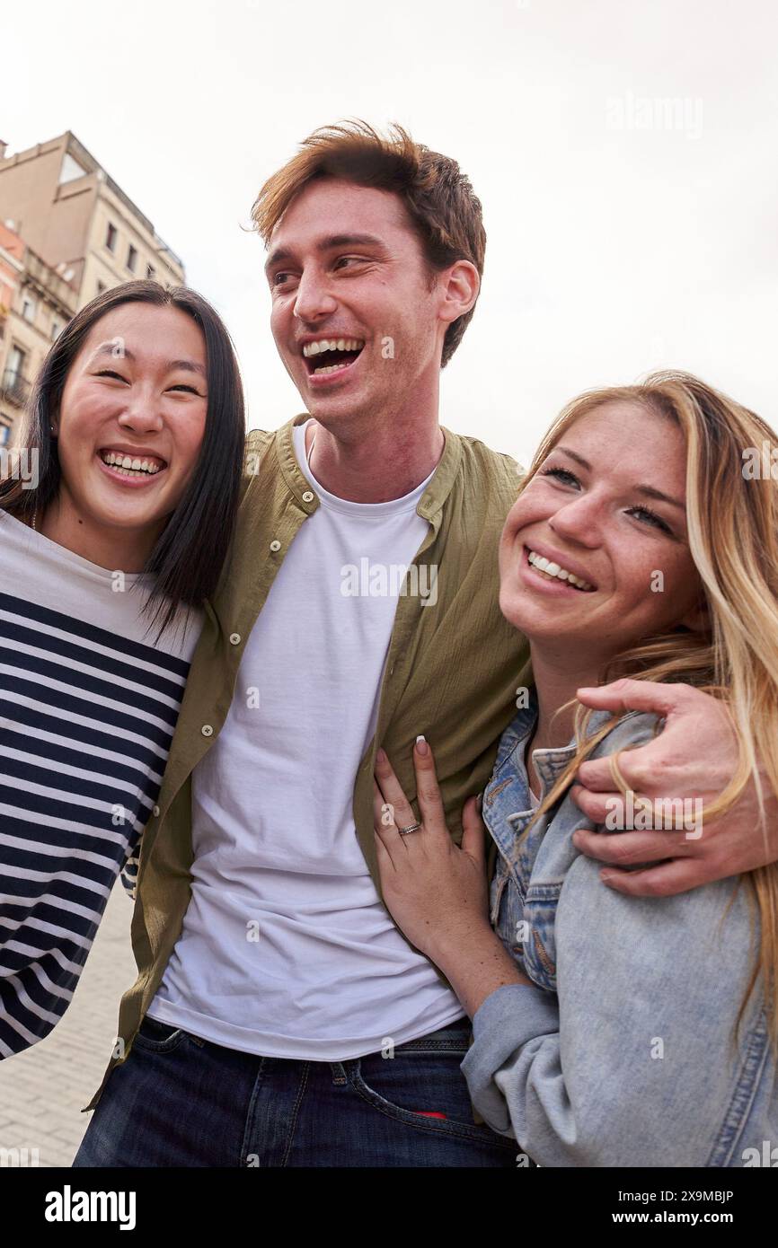 Happy multiracial three students celebrate hi-res stock photography and ...