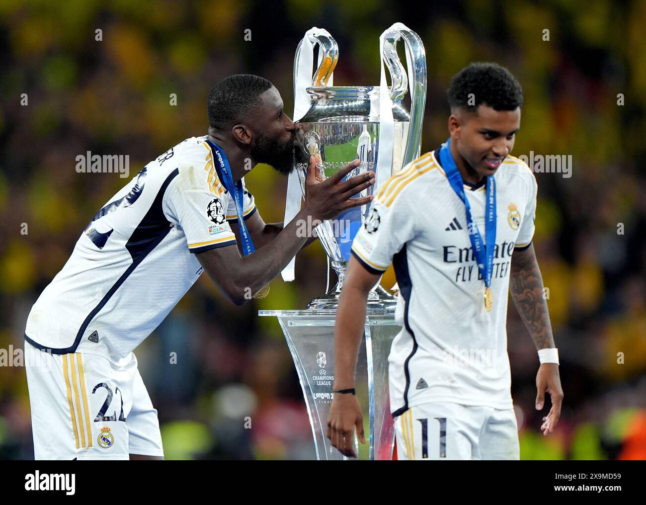 Real Madrid's Antonio Rudiger kisses the trophy after being presented ...
