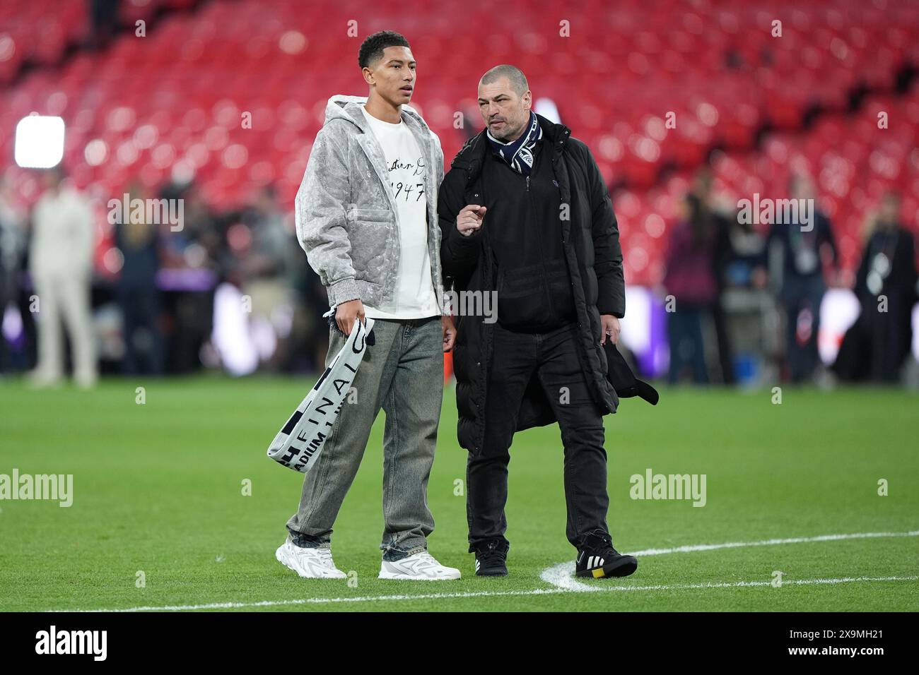 Mark Bellingham and Jobe Bellingham (left) following the UEFA Champions ...