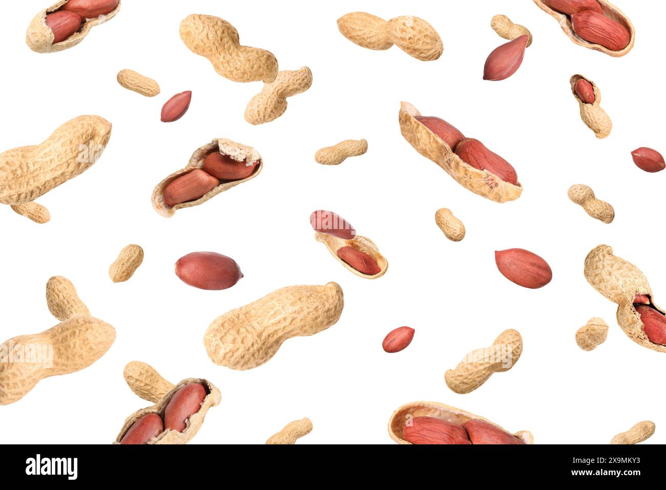 Unpeeled peanuts in air on white background Stock Photo - Alamy