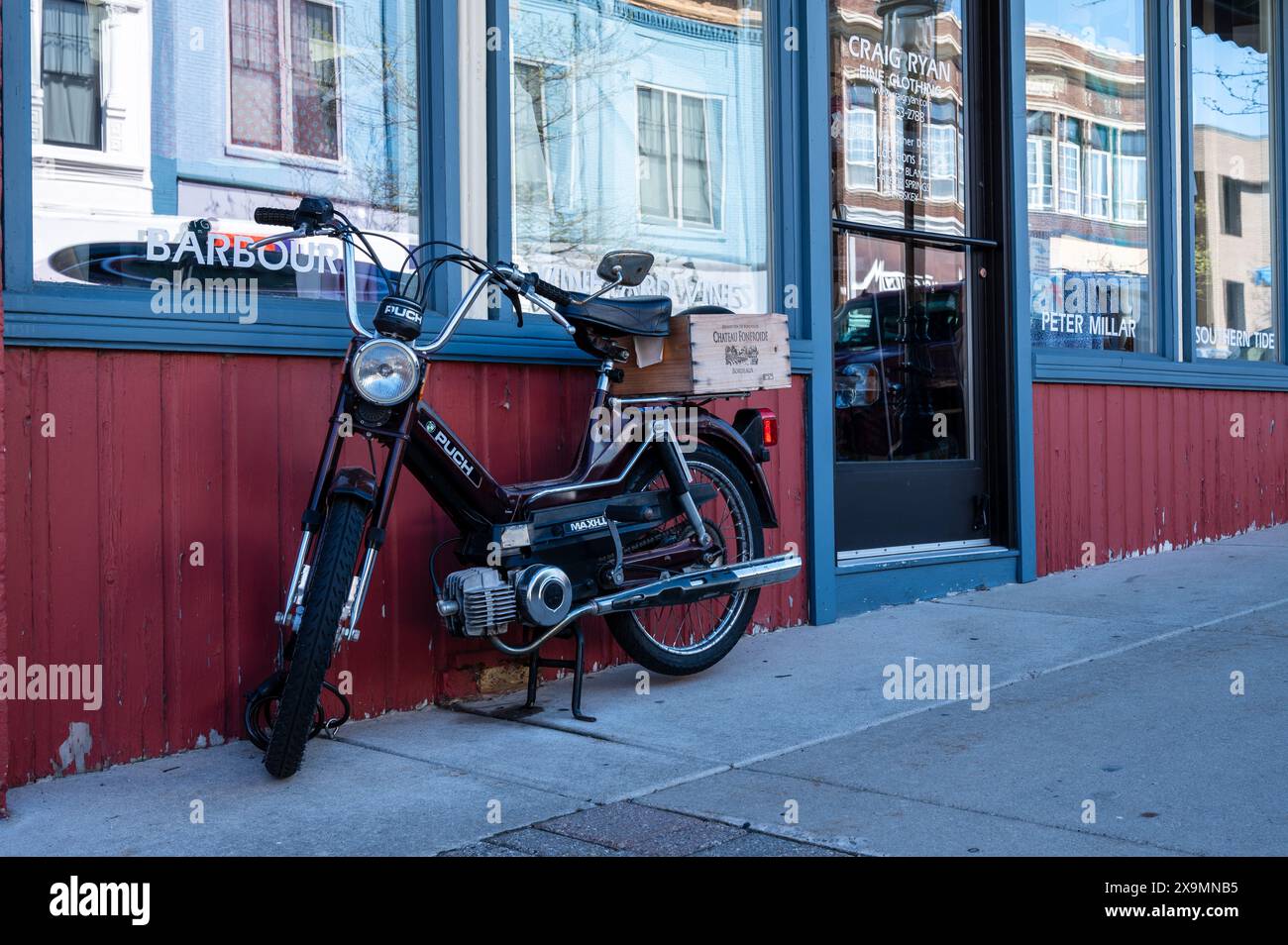 Petoskey, MI - May 18th, 2024: Vintage Moped Parked by Storefront with ...