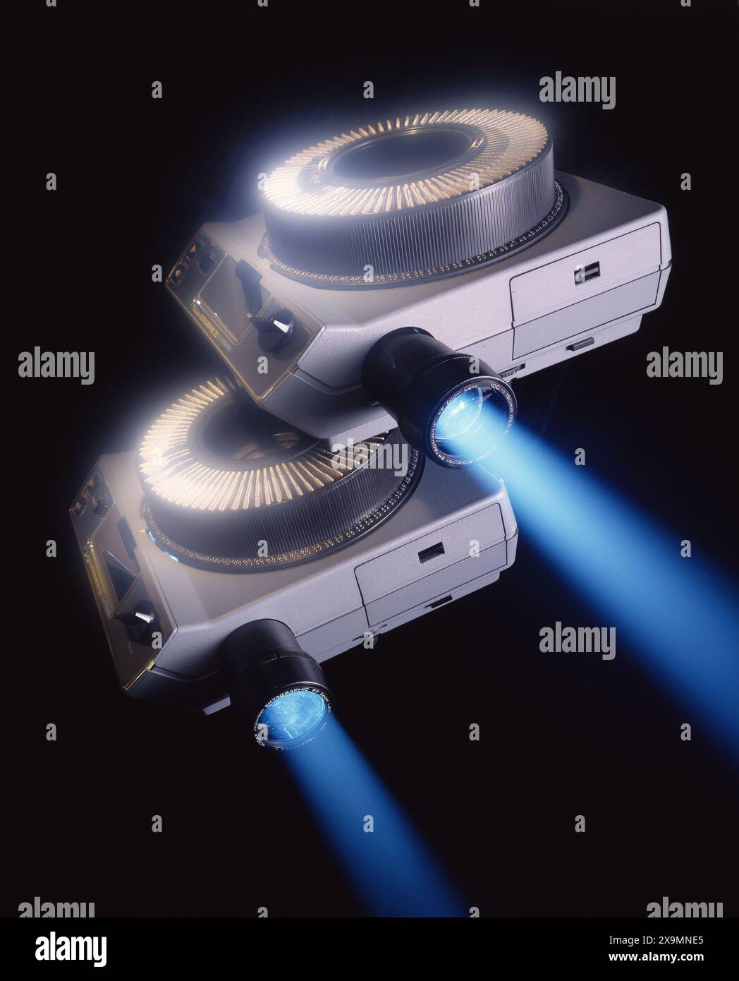 Two Kodak Carousel slide projectors. Copy space. Light beam. Vacation ...