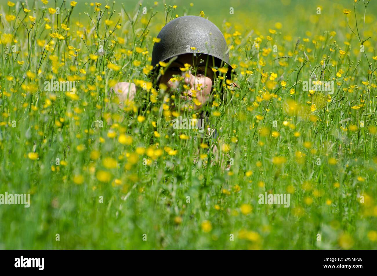 Scary Woman with Military Helmet Hidden in the Field with Yellow ...