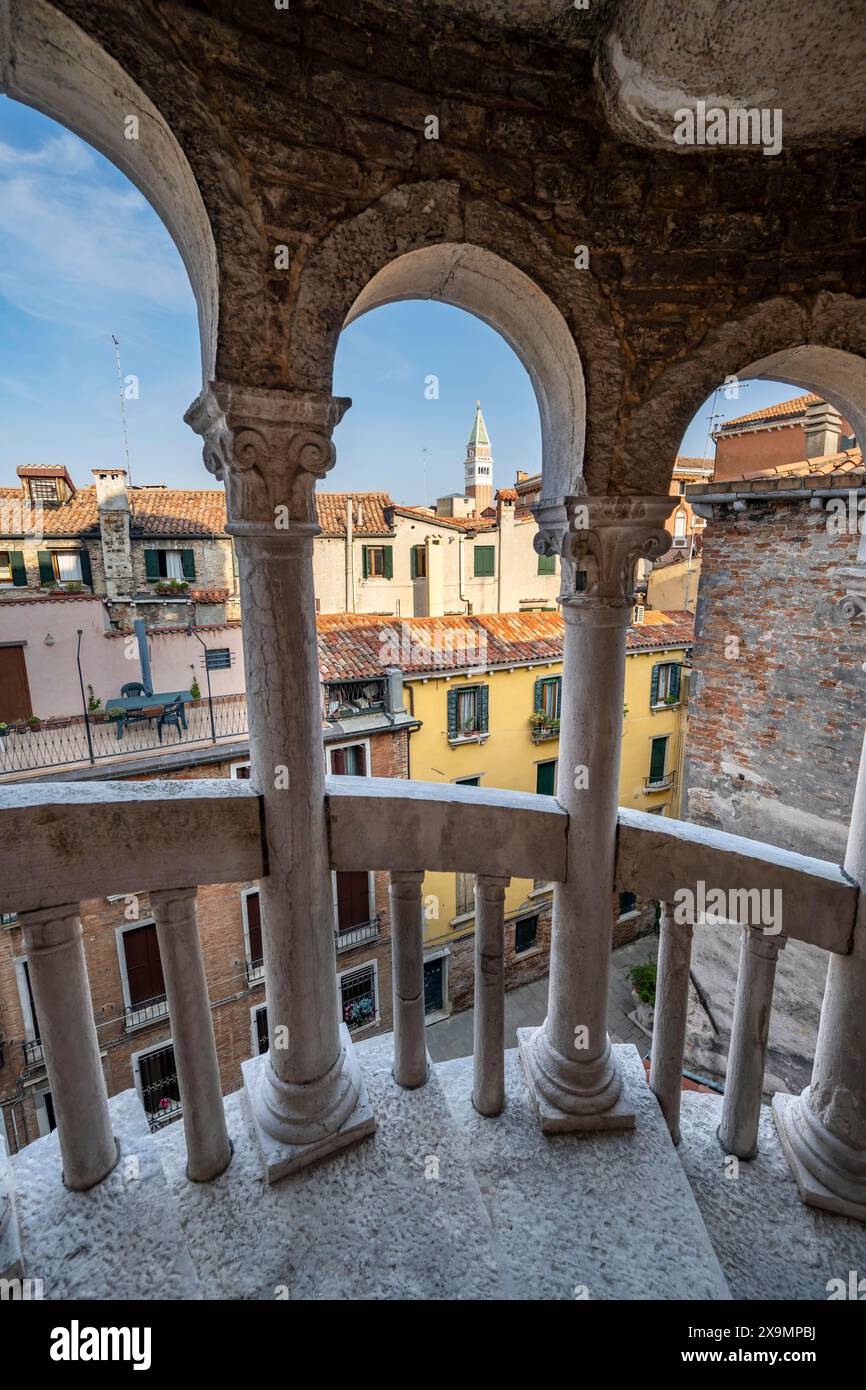View of houses in Venice from the spiral staircase of Palazzo Contarini ...