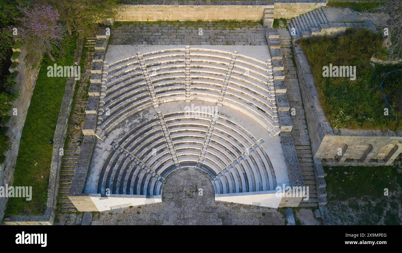 Aerial view of an ancient amphitheatre with stone seating steps ...