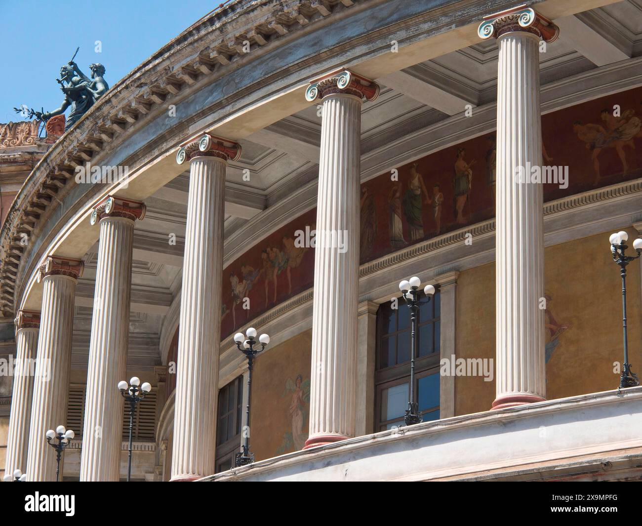 Classical architecture with columns and richly decorated facade ...