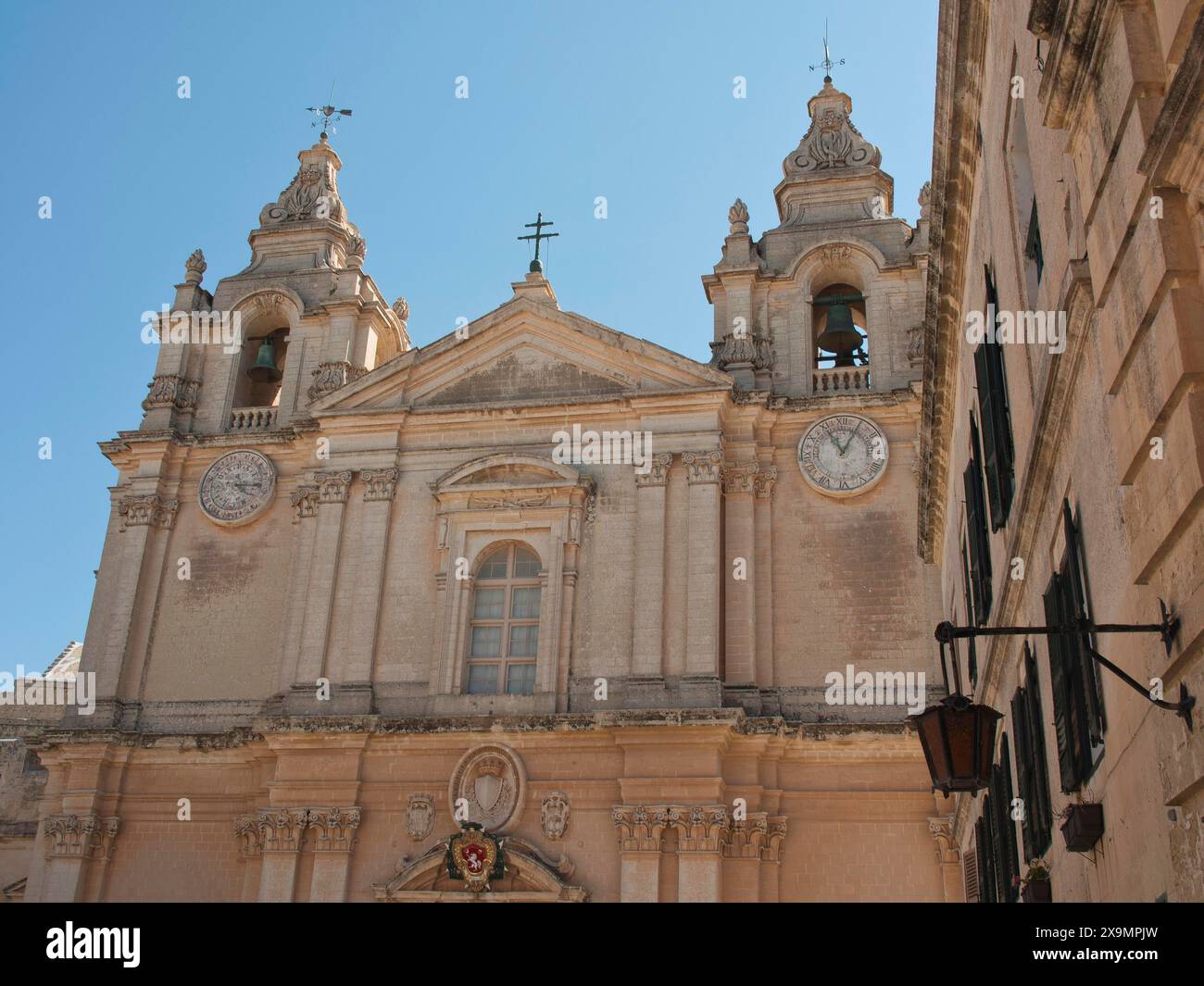 Front view of a magnificent historic church with two bell towers, the ...