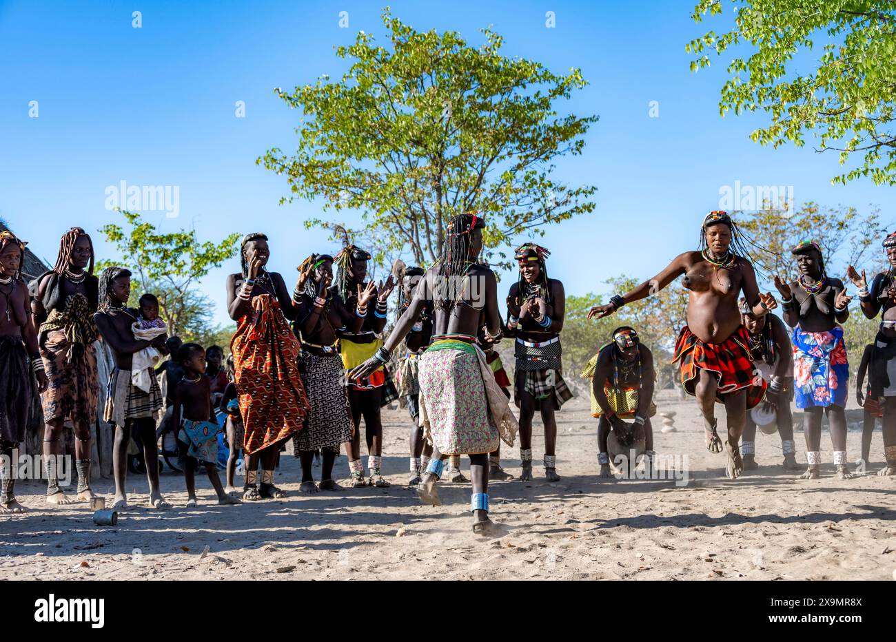 Group of traditional Hakaona woman, dancing and clapping, Angolan tribe ...