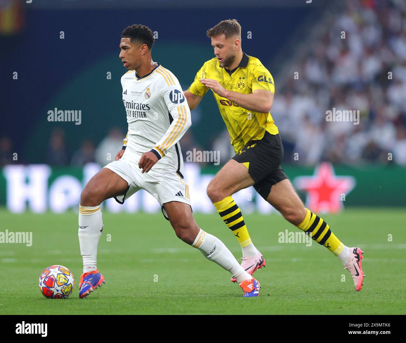 London, Britain. 1st June, 2024. Jude Bellingham (L) of Real Madrid ...