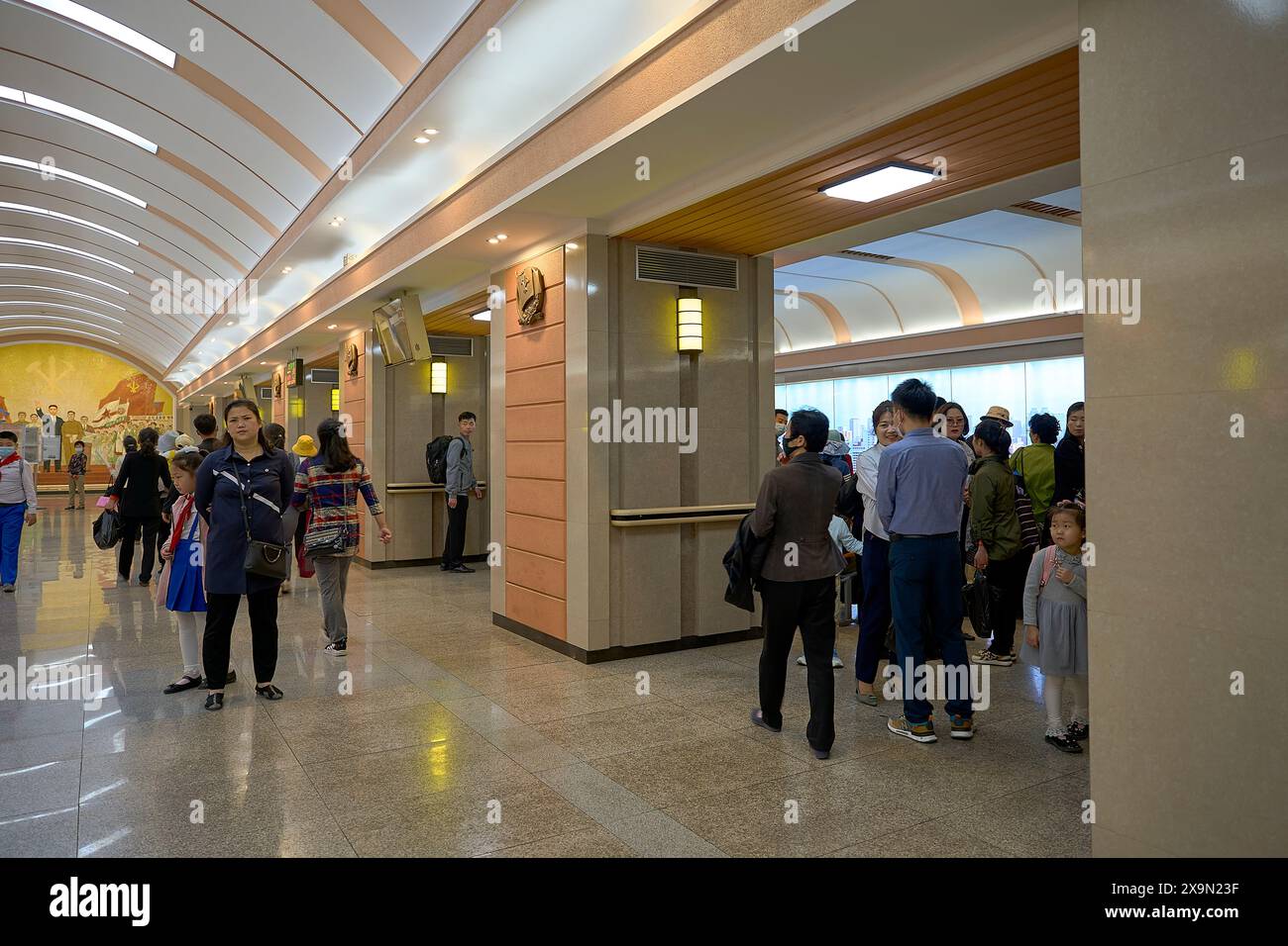 the interior of the station and passengers in the Pyongyang subway ...