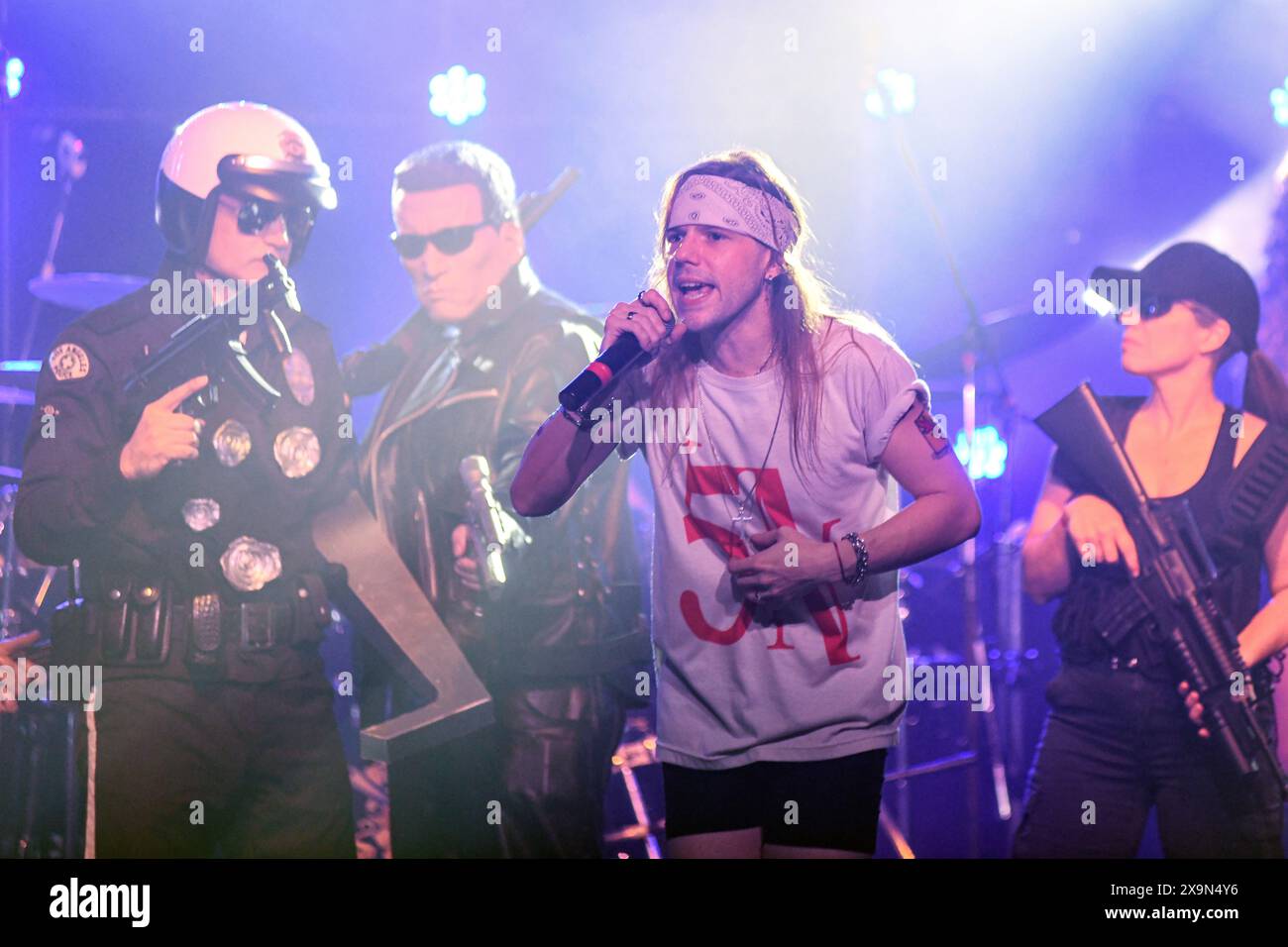 Rose Gun - The Guns N' Roses Legend (Tribute Band Stock Photo - Alamy