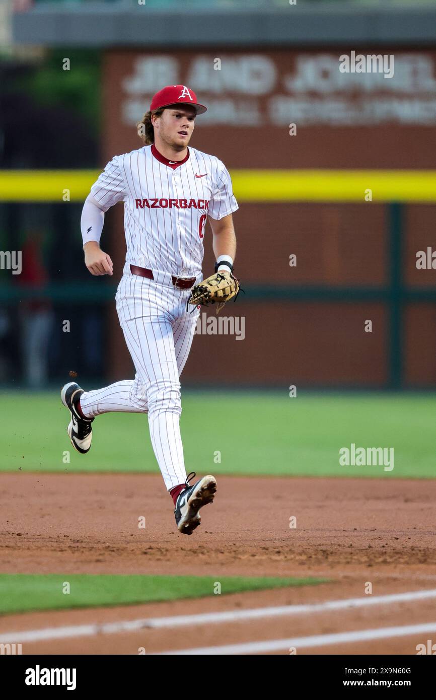 June 1, 2024: Razorback first baseman Ben McLaughlin #6 moves back over ...