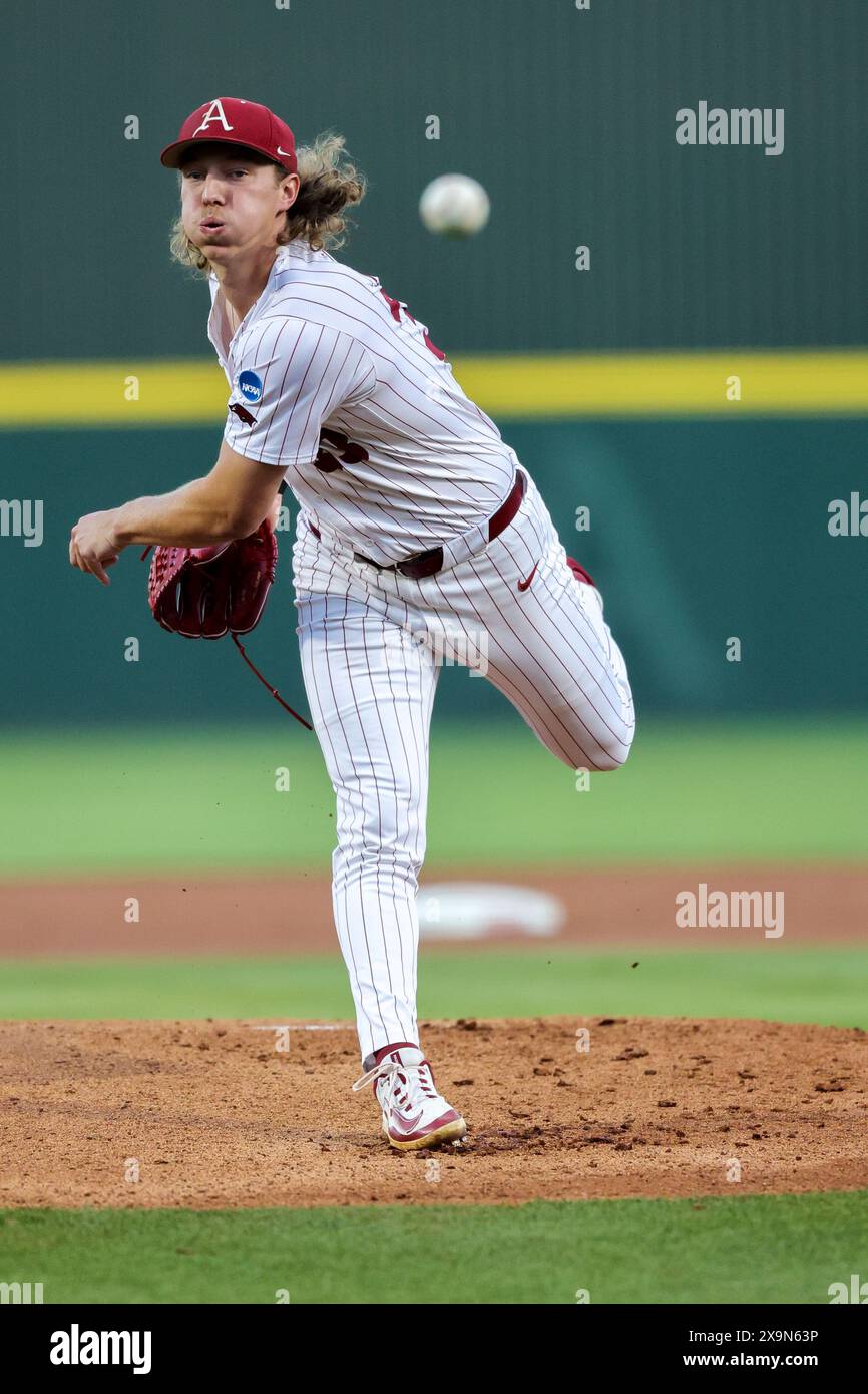 June 1, 2024: Hogs pitcher Hagen Smith #33 watches as his ball he just ...
