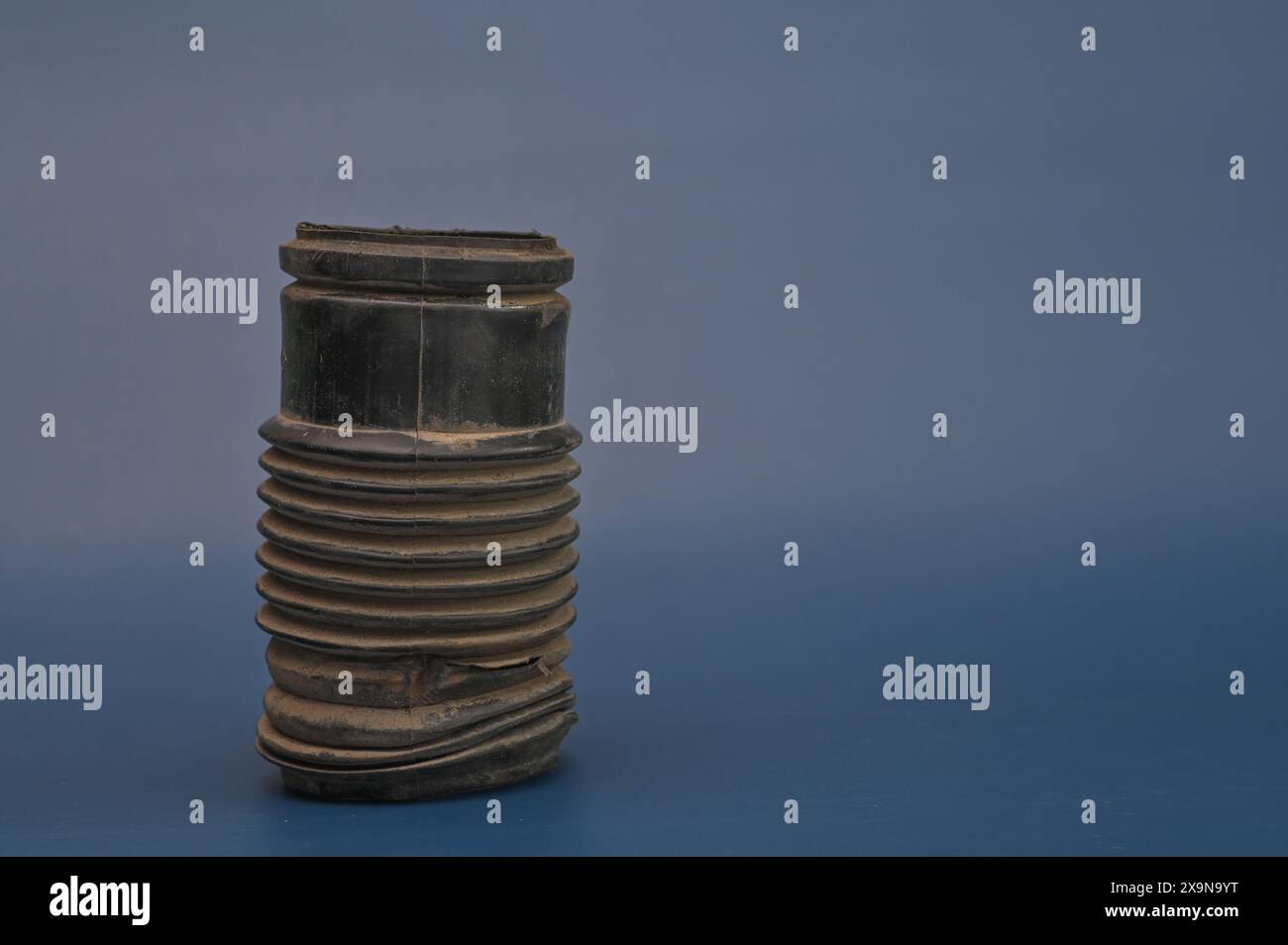 worn cover for a car shock absorber Stock Photo - Alamy