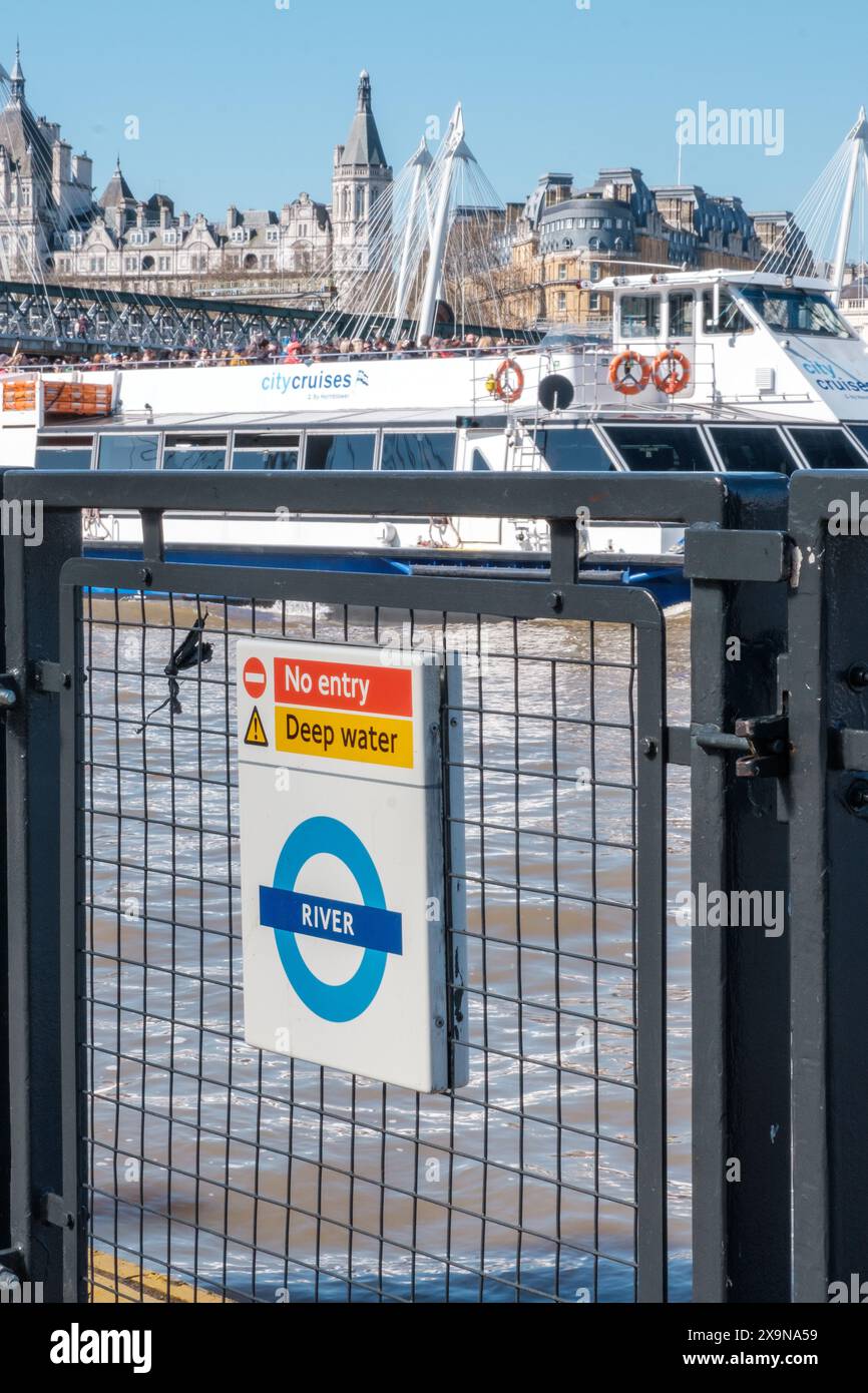 The River Thames at Southbank London. Locked metal gate, sightseeing ...