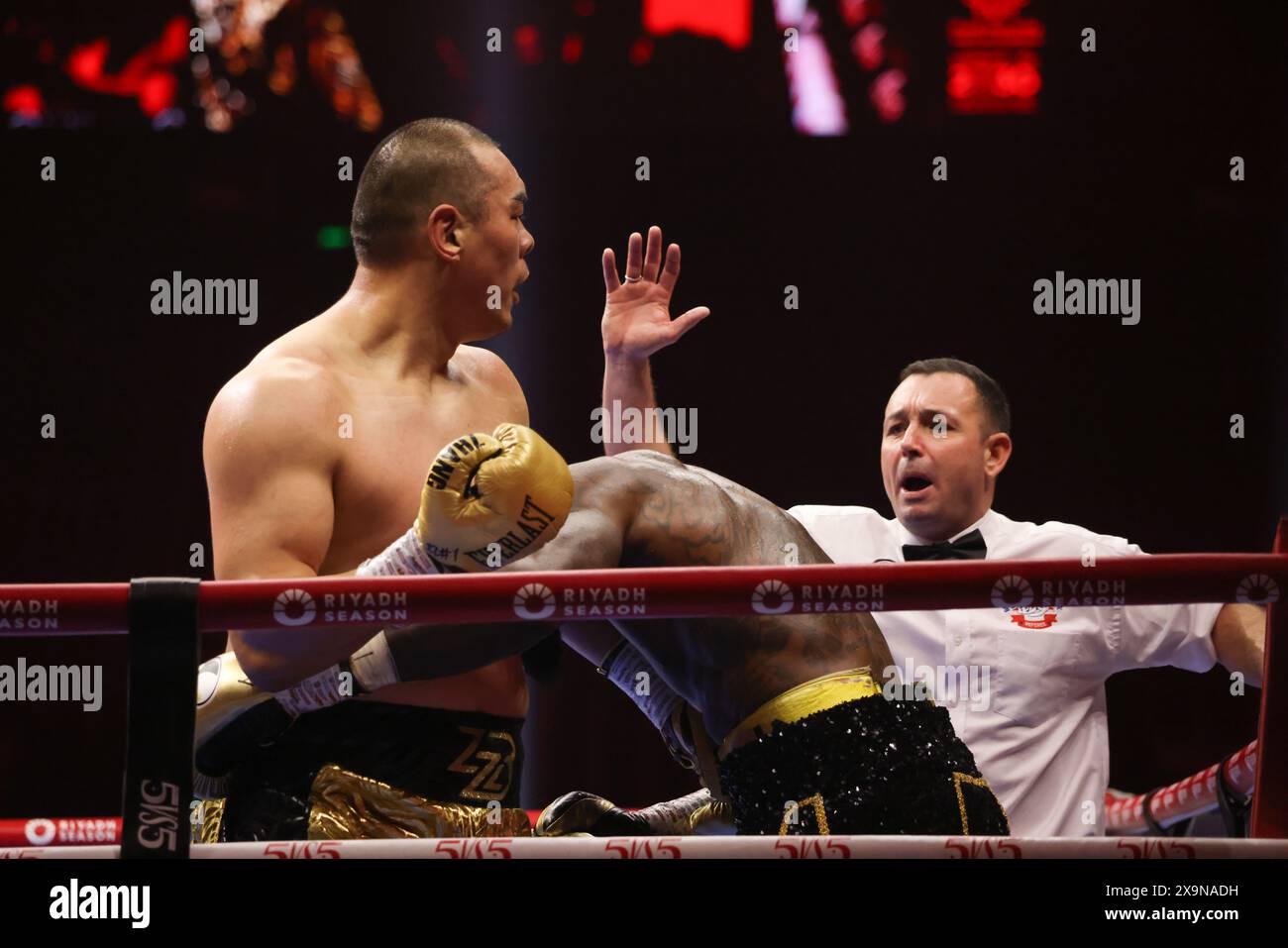 Riyadh, Saudi Arabia. 2nd June, 2024. Zhang Zhilei (L) of China fights ...