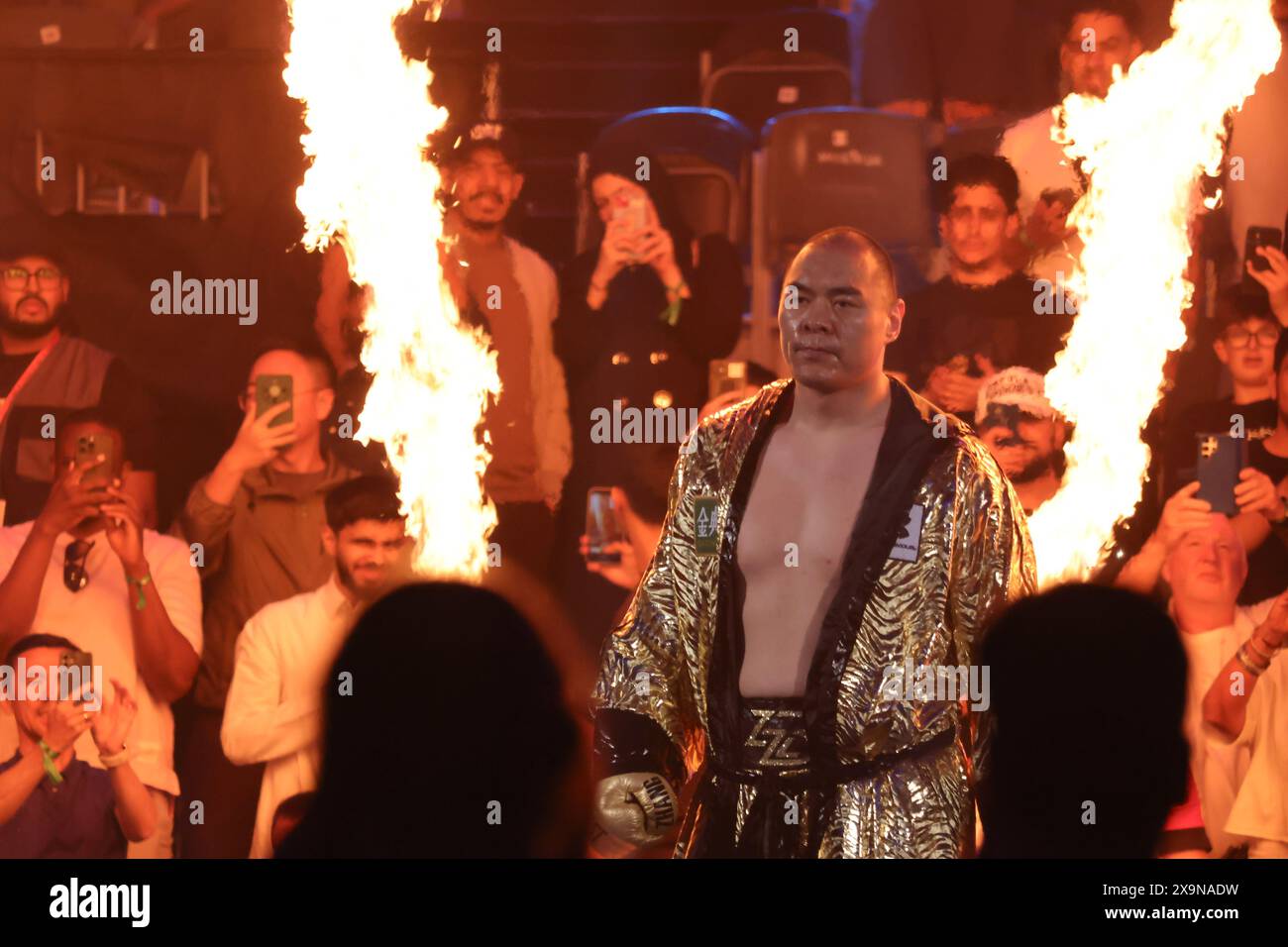 Riyadh, Saudi Arabia. 2nd June, 2024. Zhang Zhilei (R) of China arrives ...
