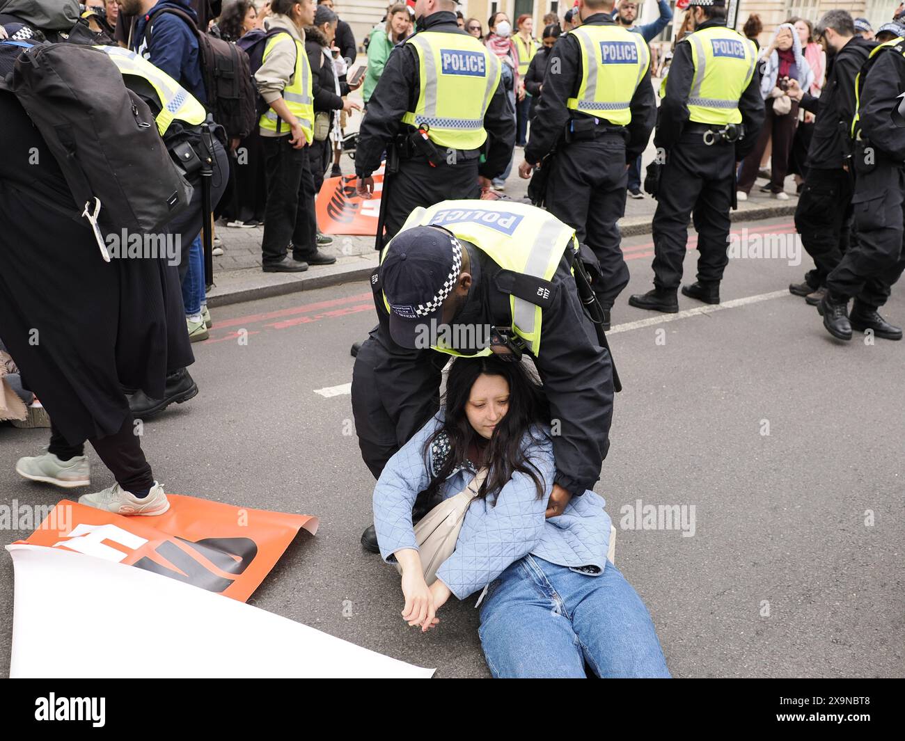 Youth Demand protester being dragged out of the road by the Police ...