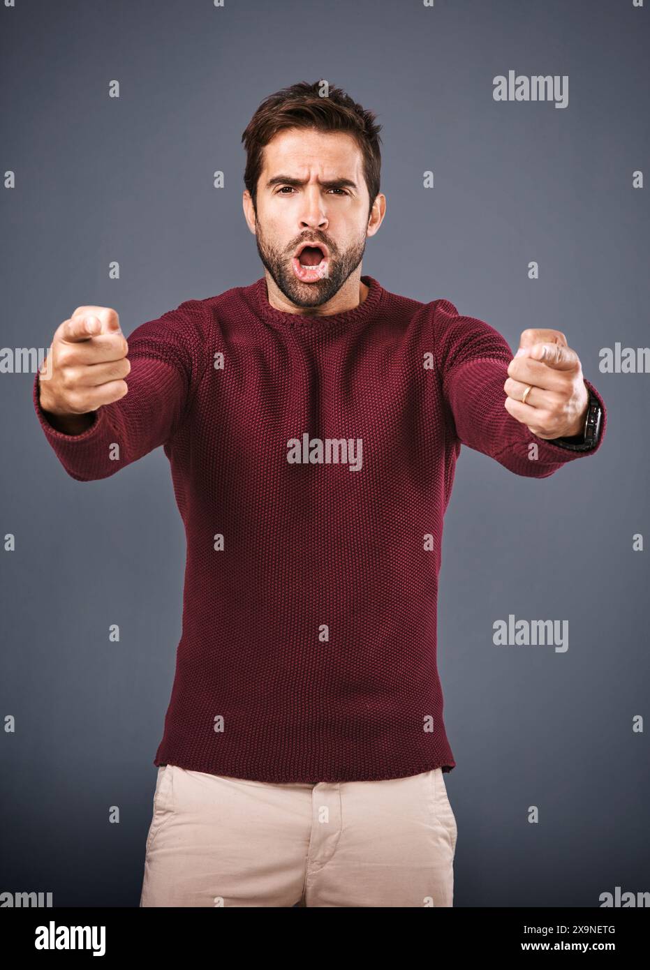 Studio, furious and portrait of man, pointing and accountability for ...