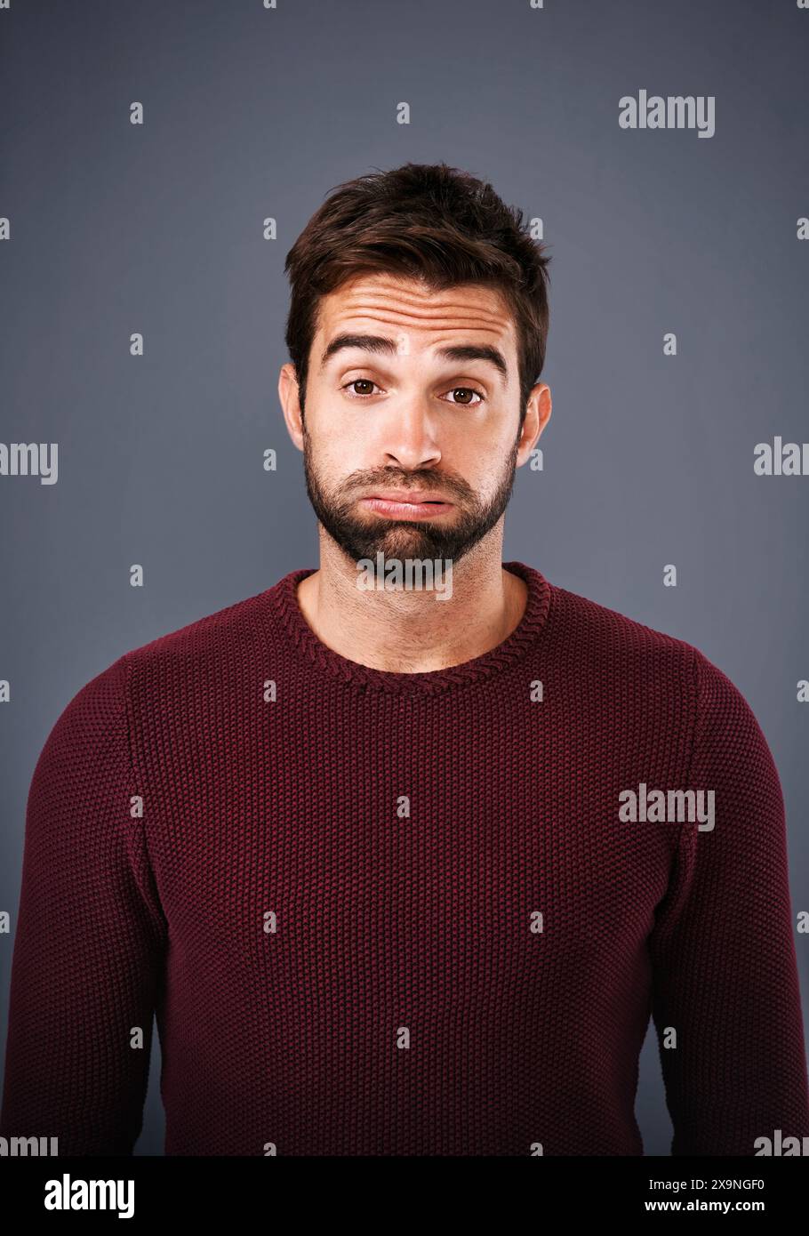 Studio, portrait and stress of man, tired and burnout with depression ...