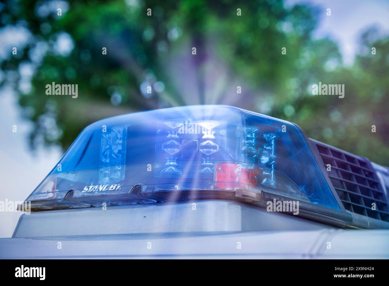 Police car in action Stock Photo - Alamy