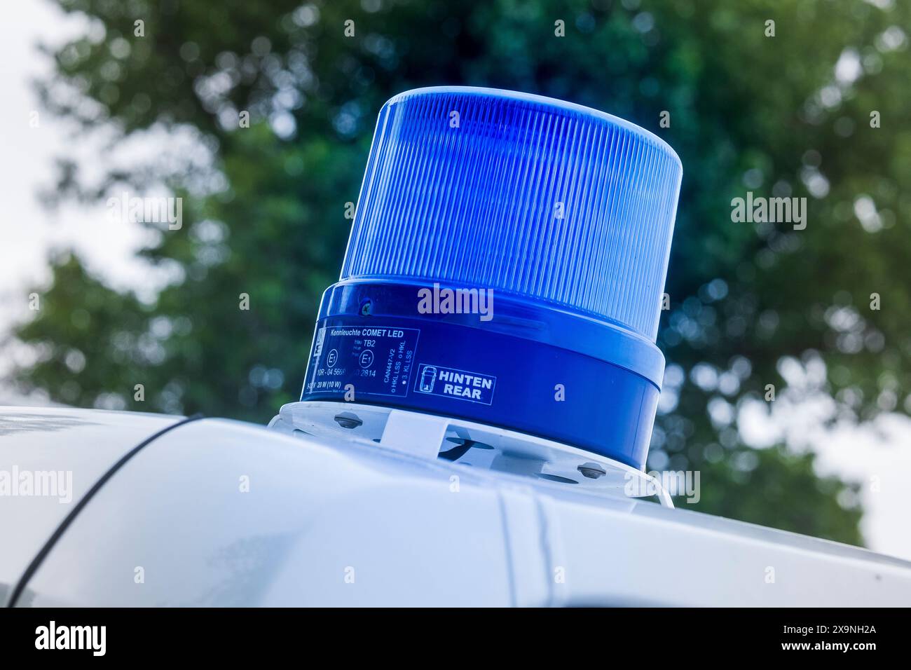 Police car in action Stock Photo - Alamy